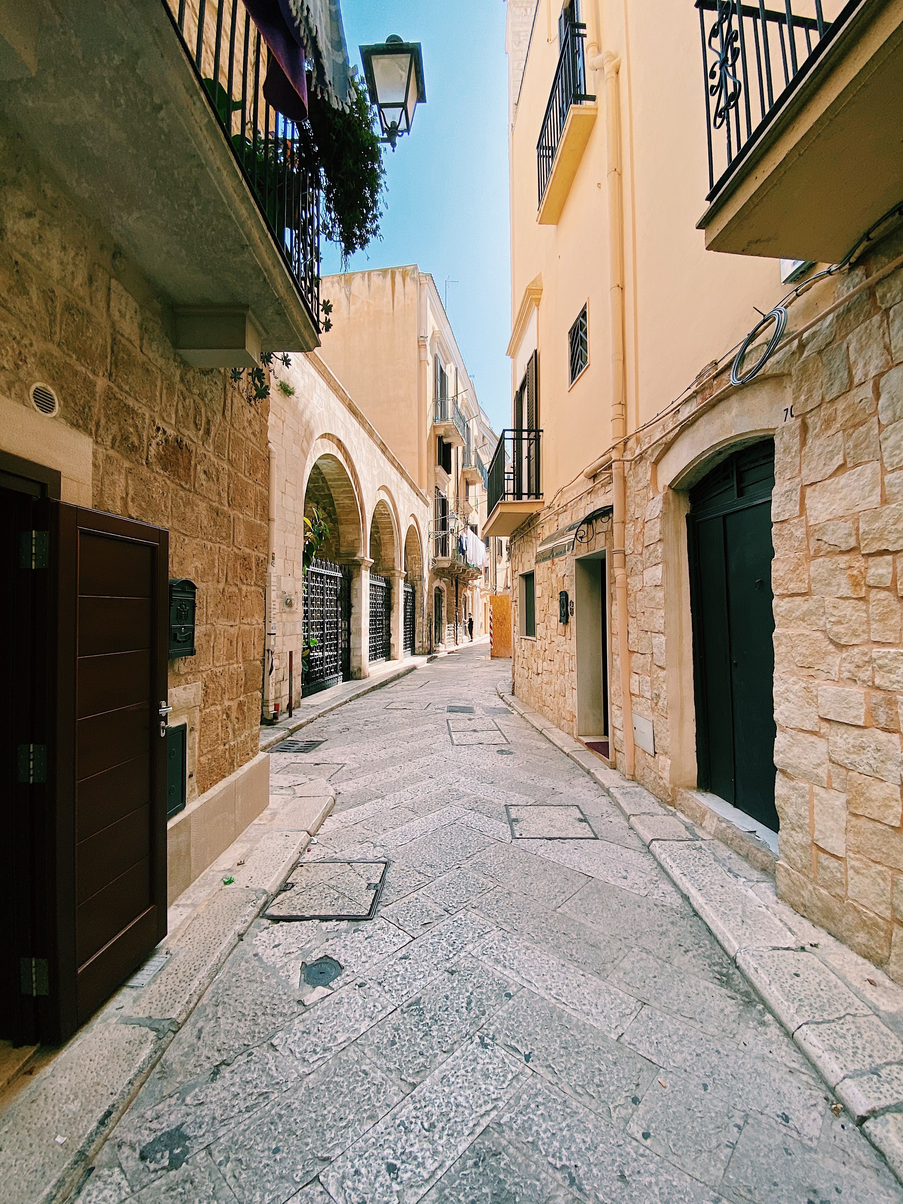 Apartment Buildings Between an Alley · Free Stock Photo