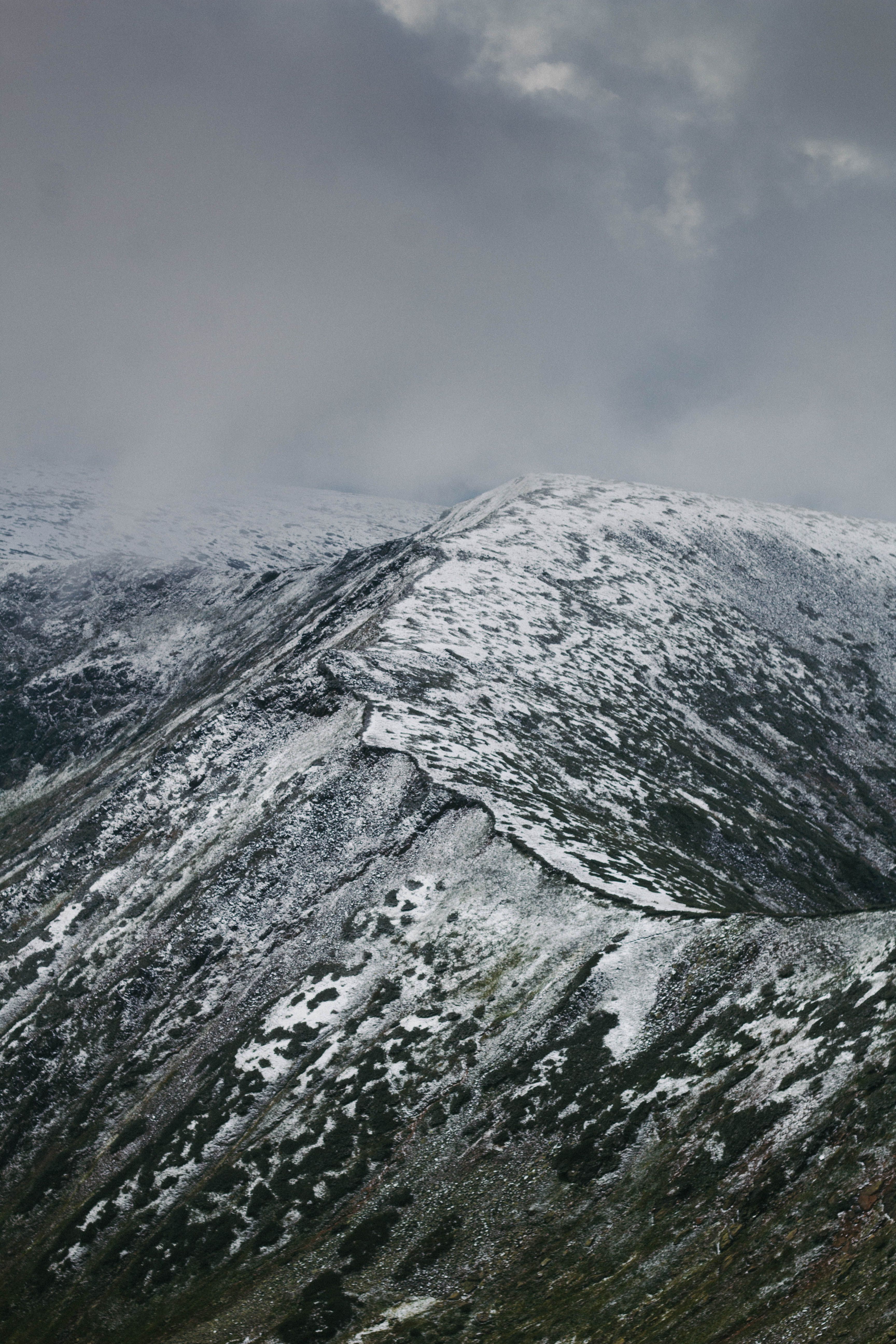 Gray and White Mountain Under Gray Sky · Free Stock Photo