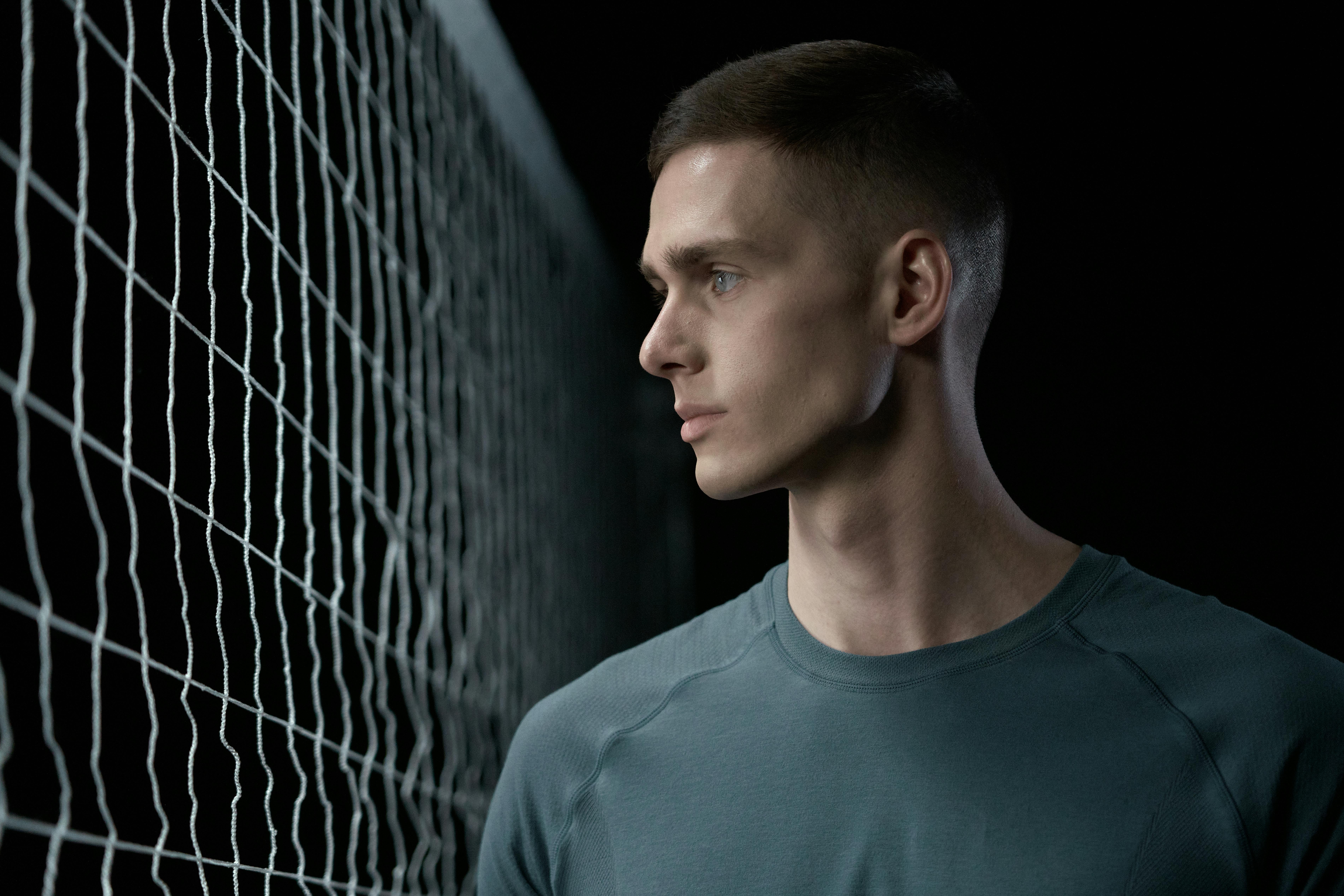 Peson Standing Beside a Net · Free Stock Photo