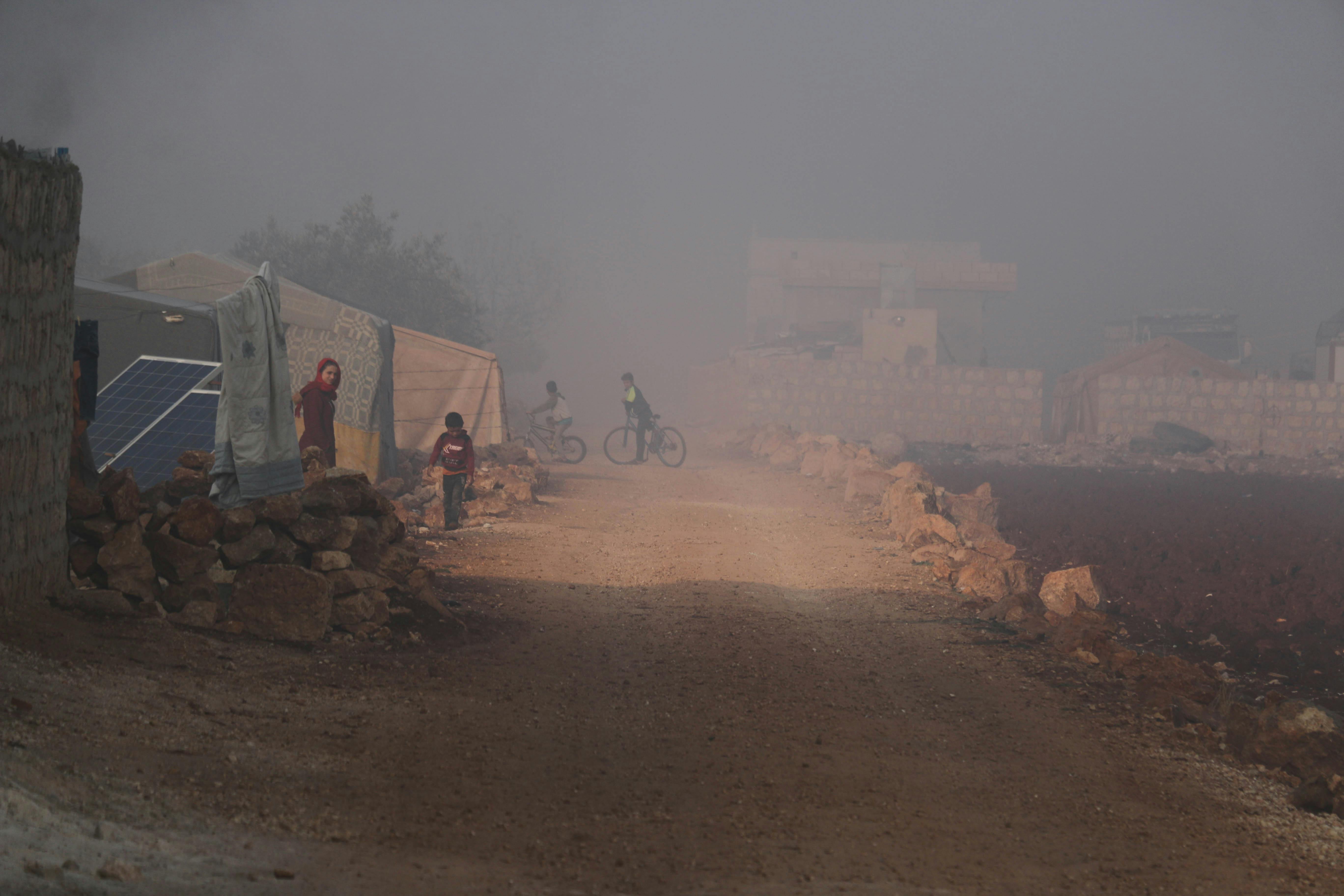 People on Dusty Road · Free Stock Photo