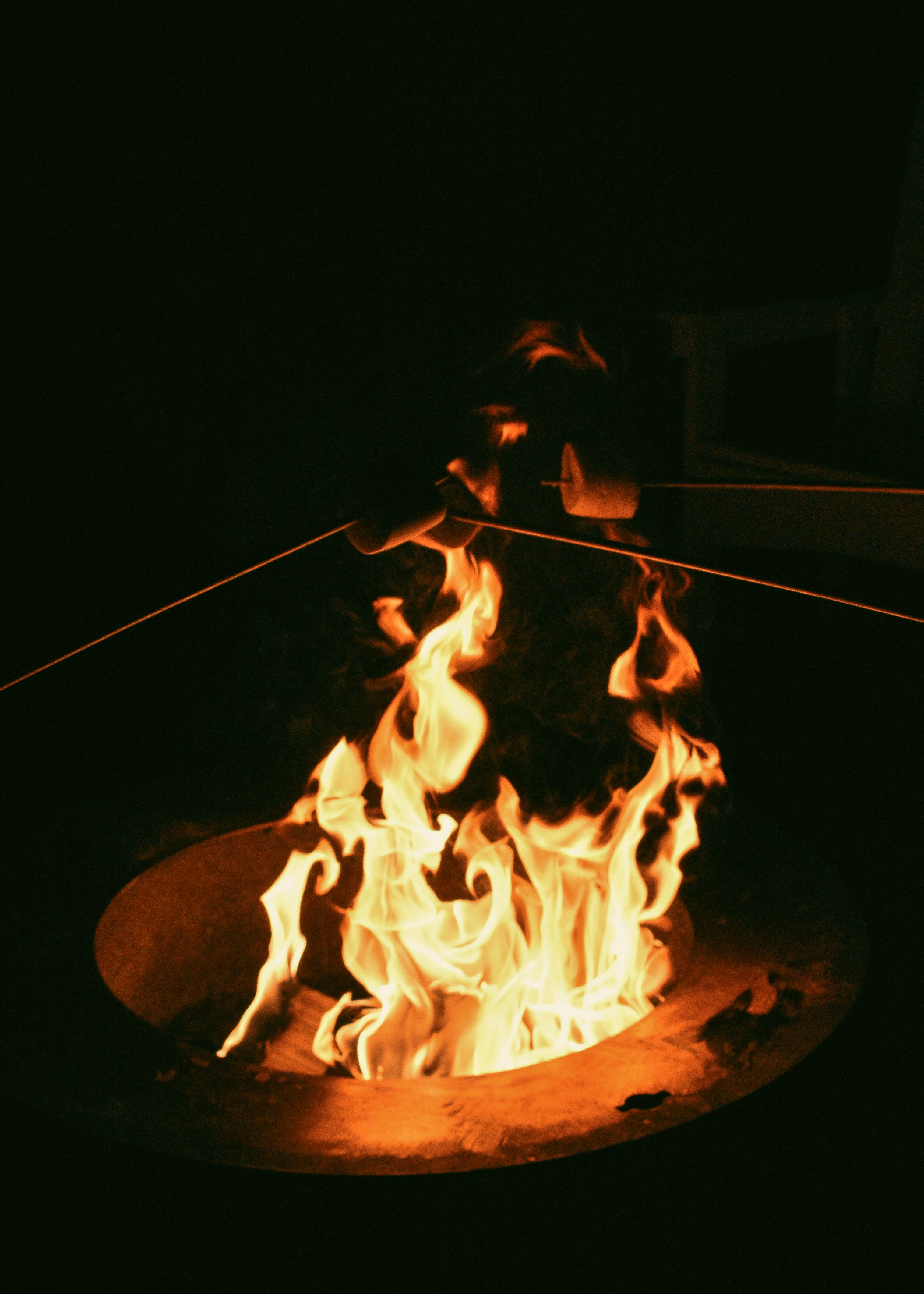 Selective Focus Photography of Lighted Lawn Torch · Free Stock Photo