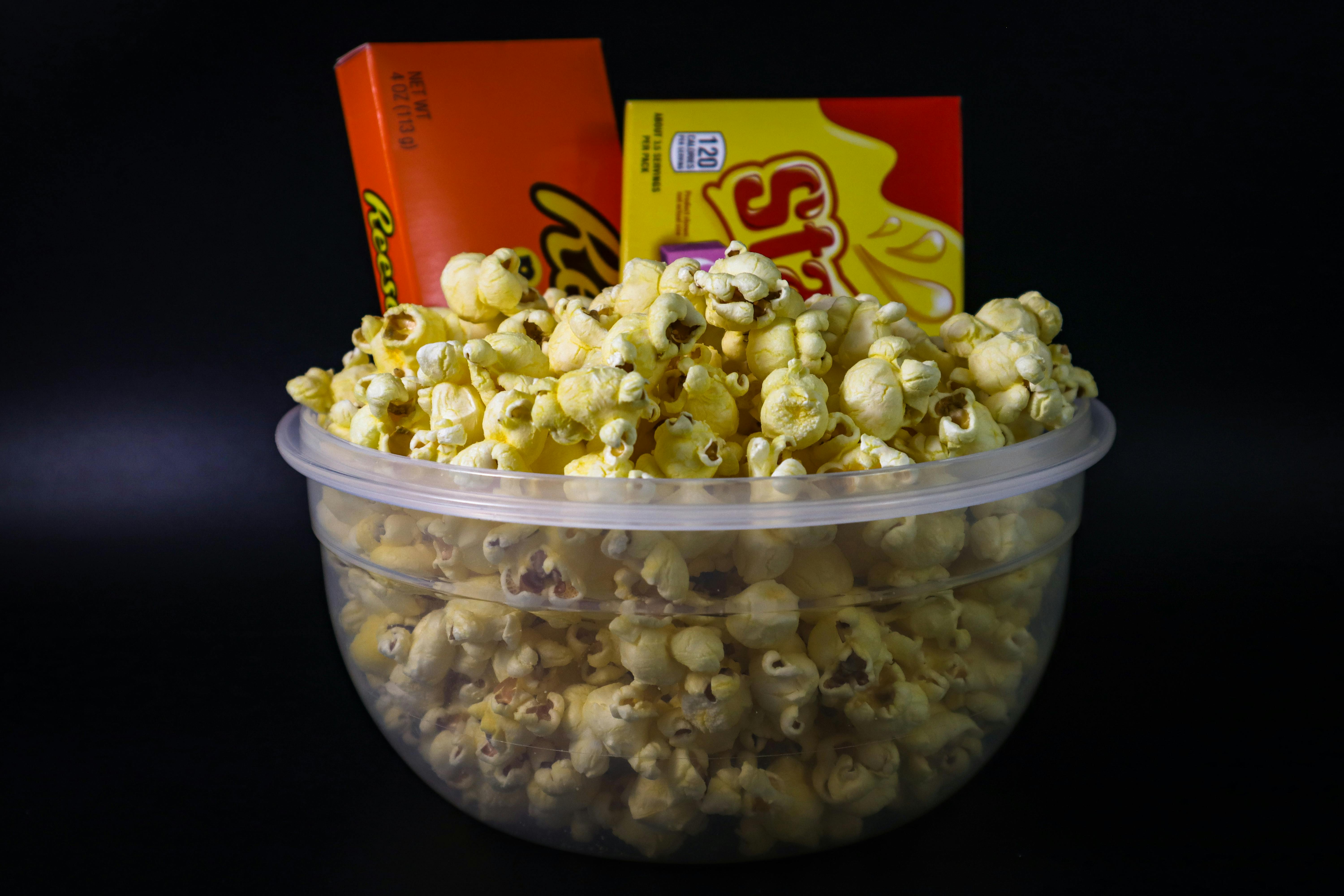 Popcorn in Clear Plastic Container · Free Stock Photo