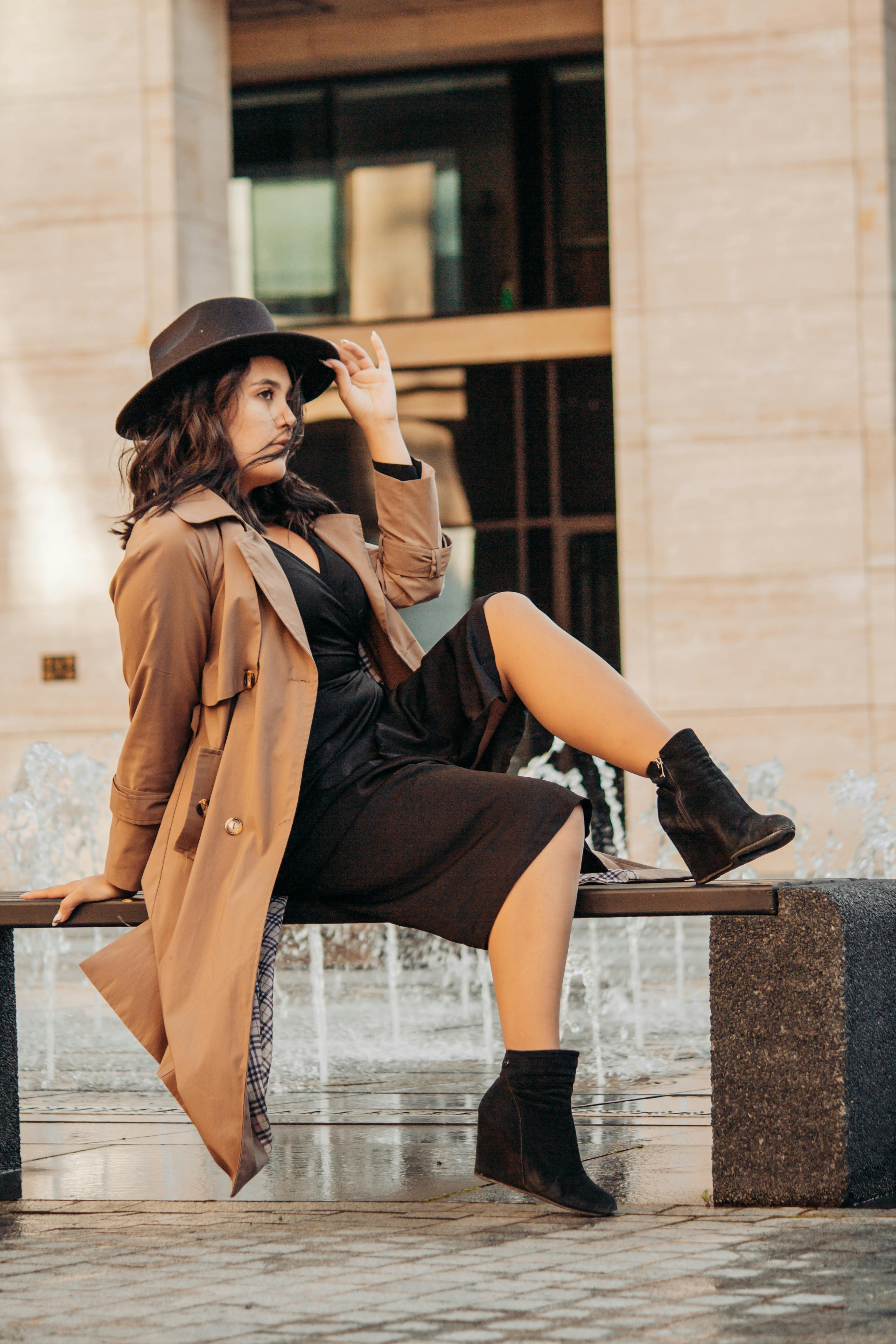 Woman Wearing a Brown Coat Over her Black Dress · Free Stock Photo