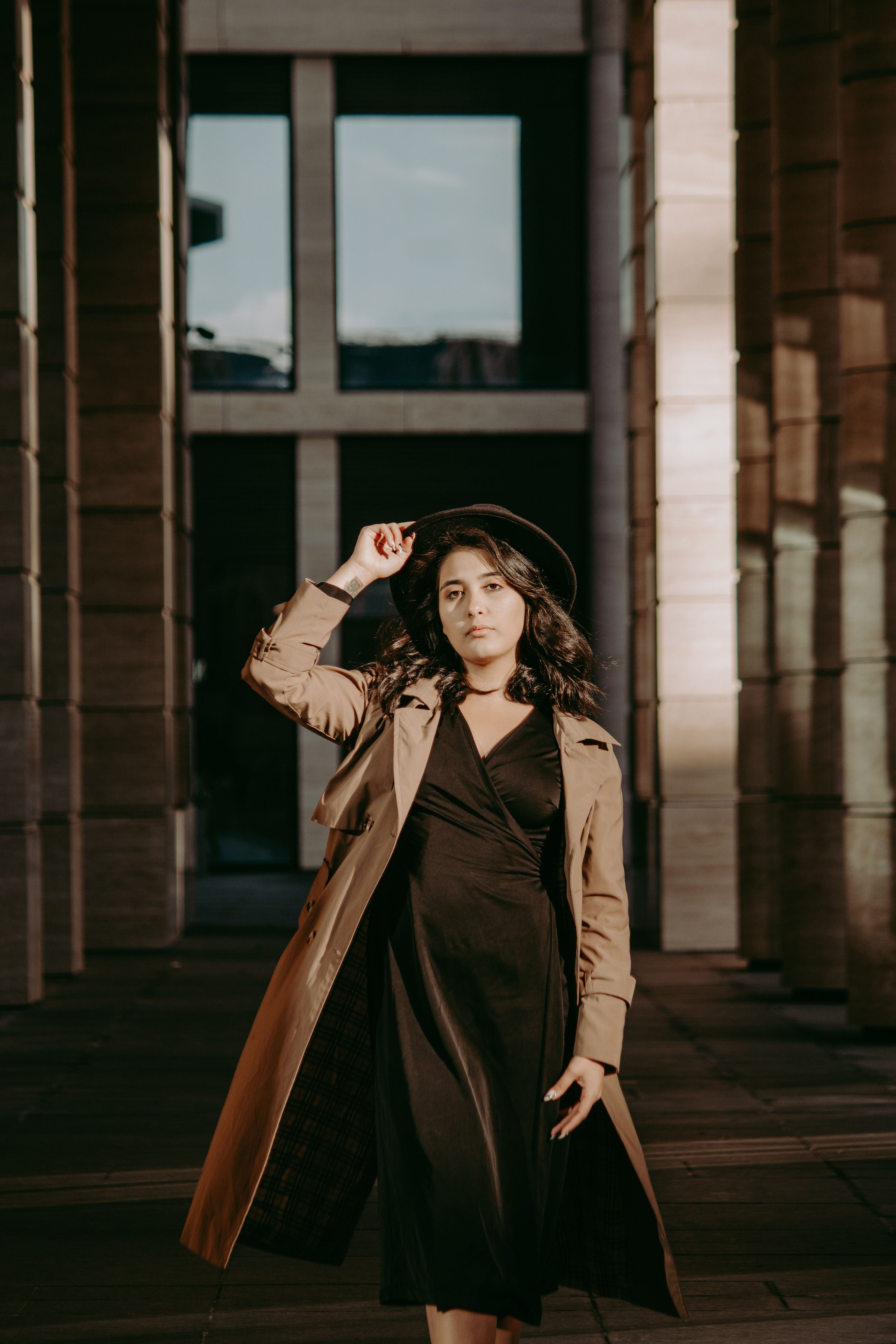 Woman Wearing a Coat Over her Dress · Free Stock Photo