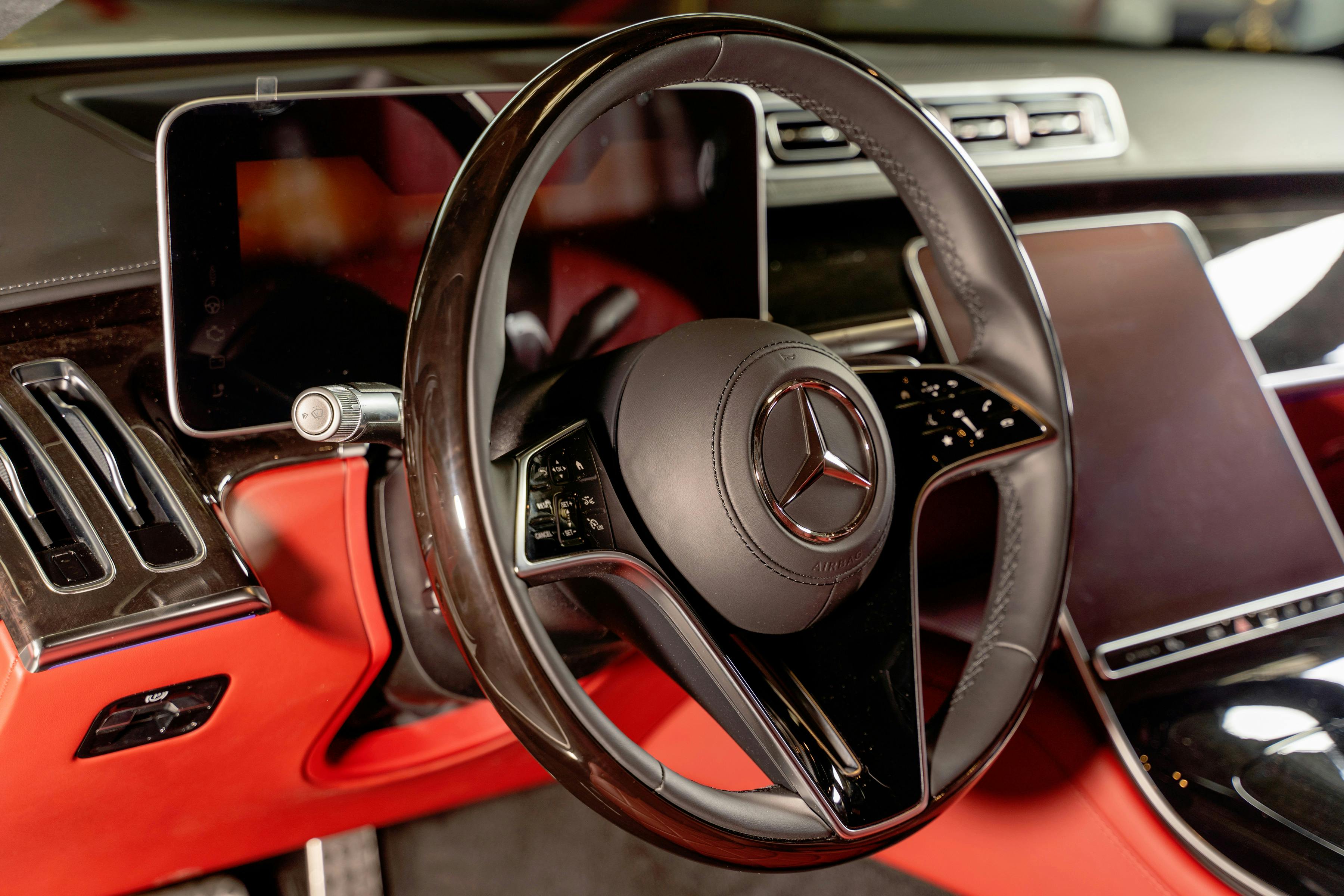 Close-Up Shot of a Steering Wheel of a Car · Free Stock Photo