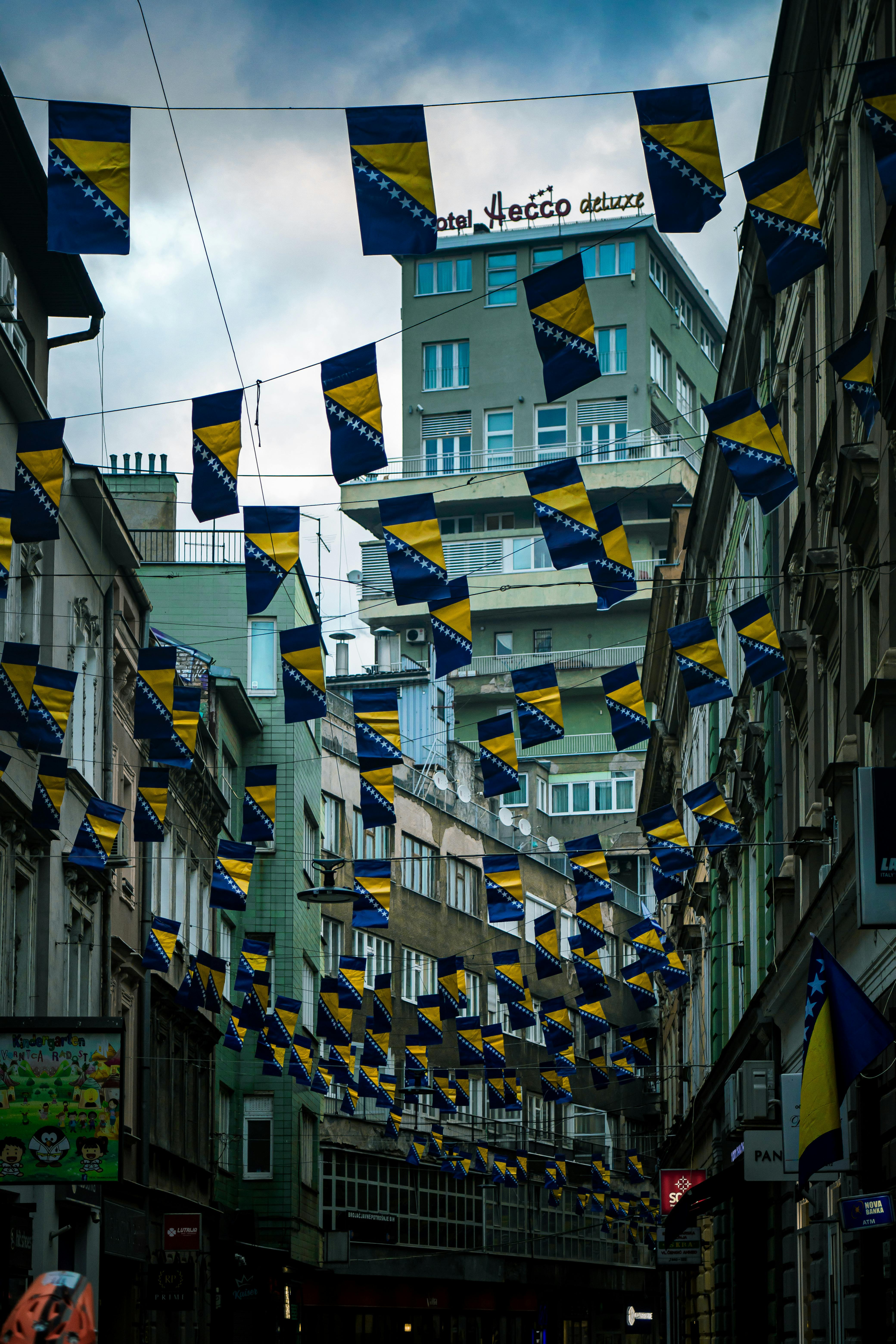 Flags Hanging on the Street · Free Stock Photo