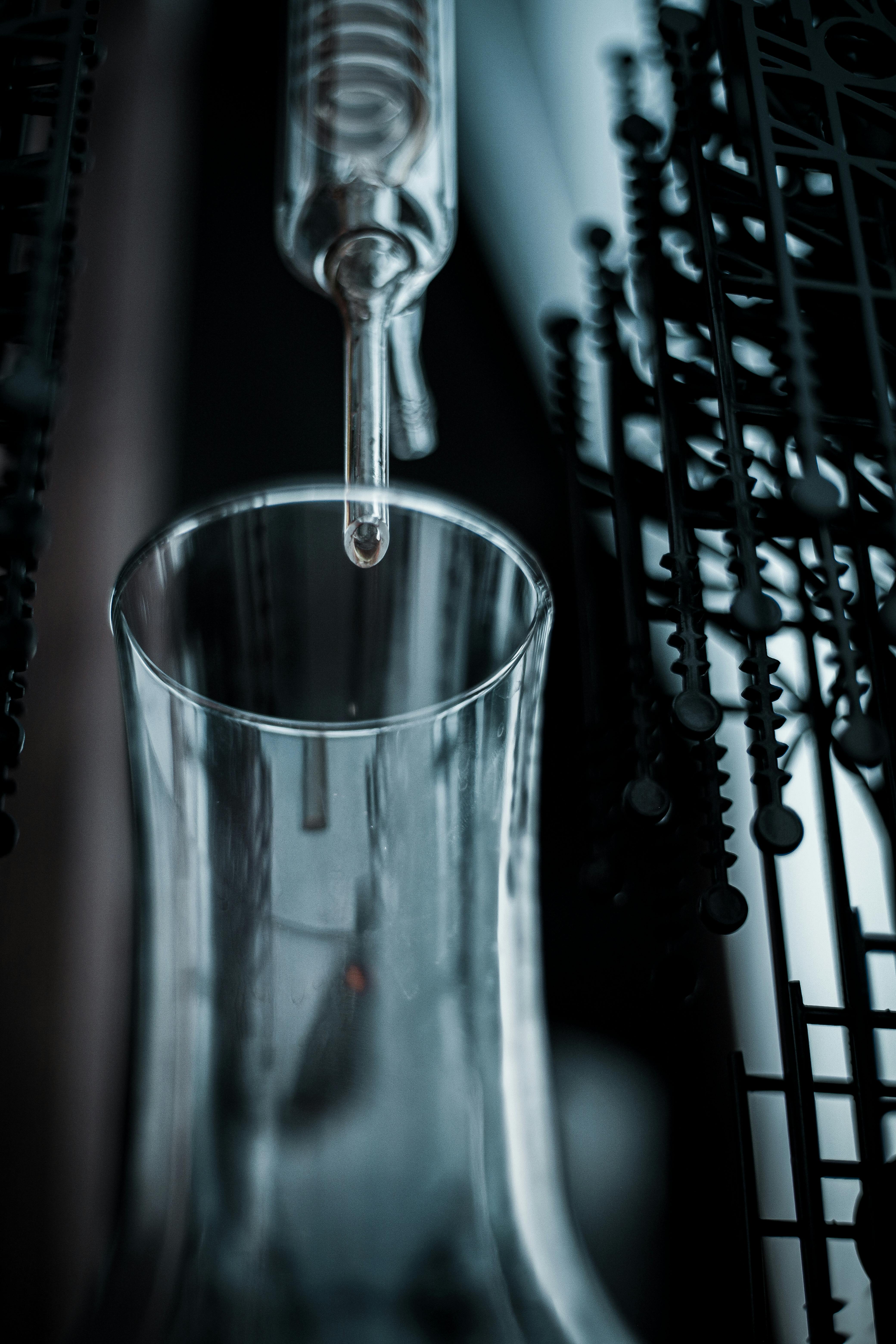 A Clear Glass with Reflections in Close-up Shot · Free Stock Photo