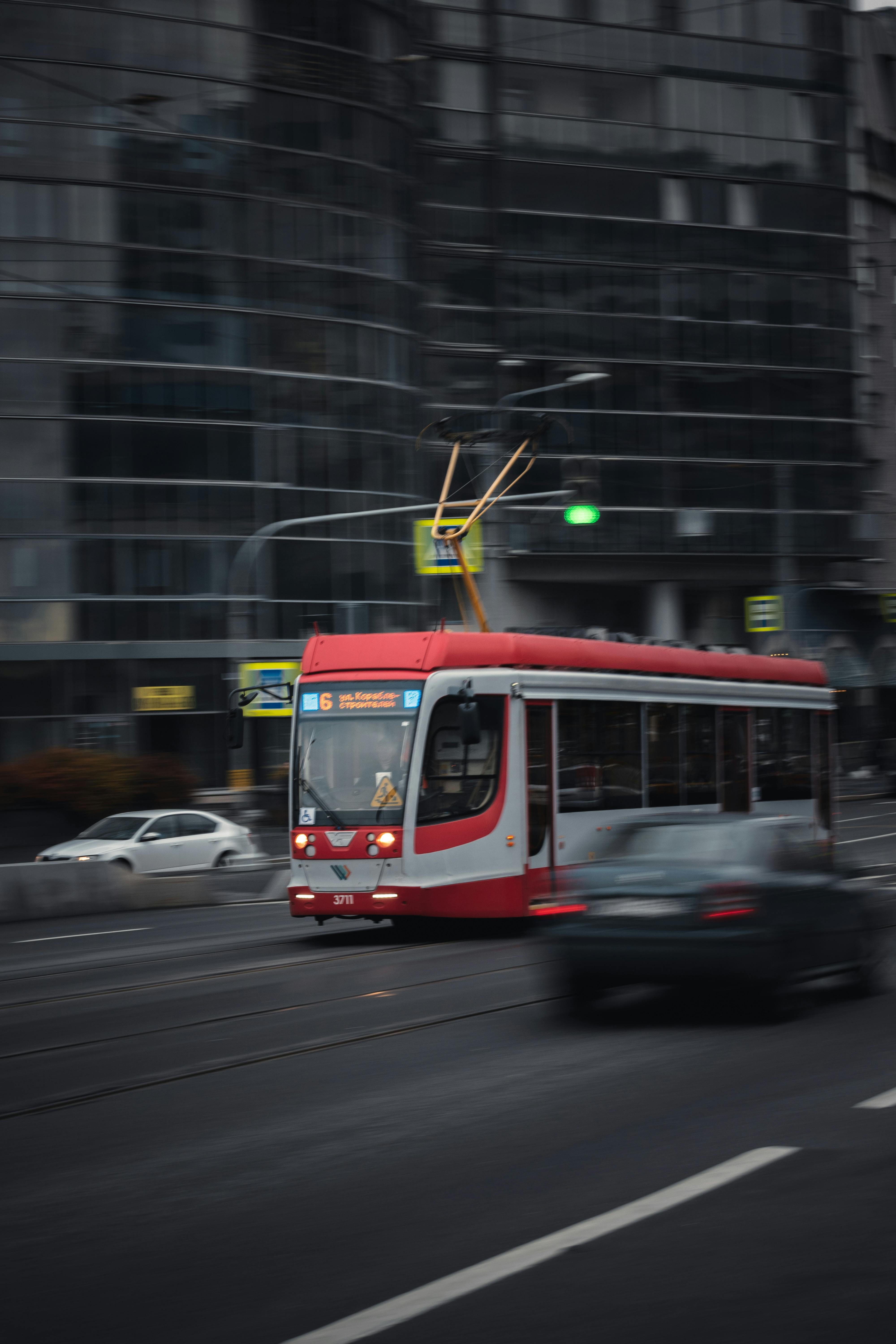 Red and White Tram on Road · Free Stock Photo