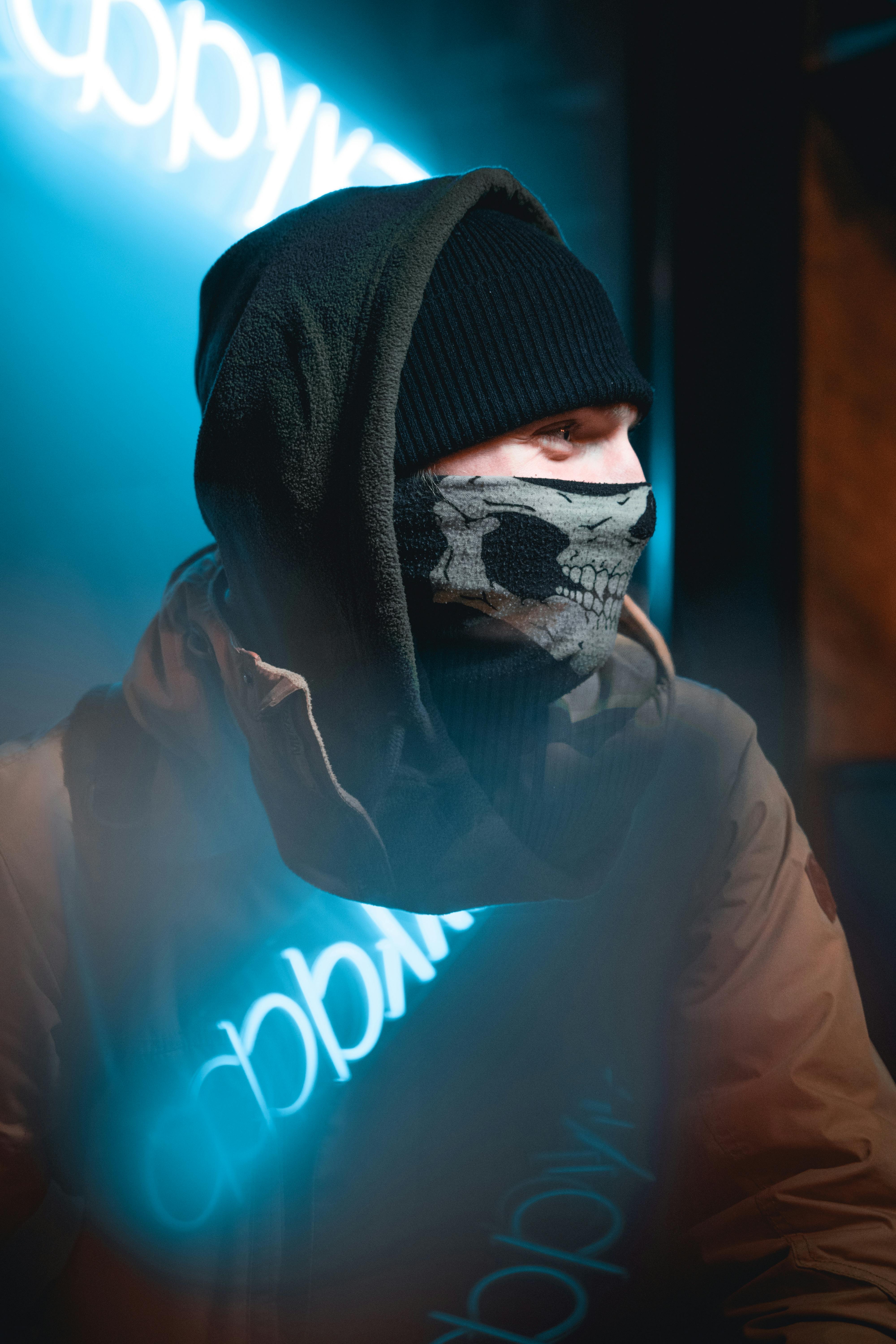 Shirtless Man Wearing a Scary Mask and Animal Skin · Free Stock Photo