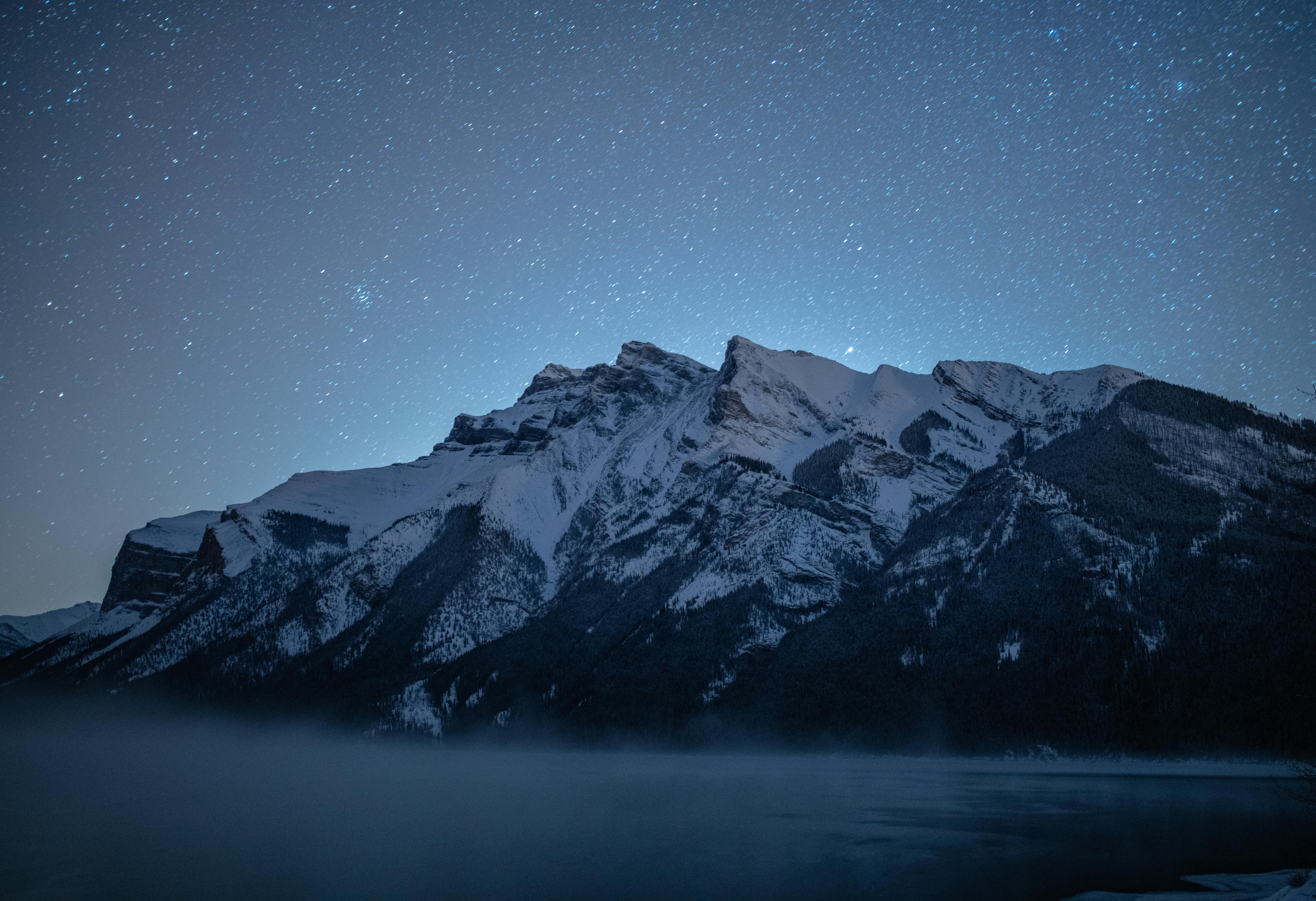 Snow Covered Mountain Under the Stars · Free Stock Photo