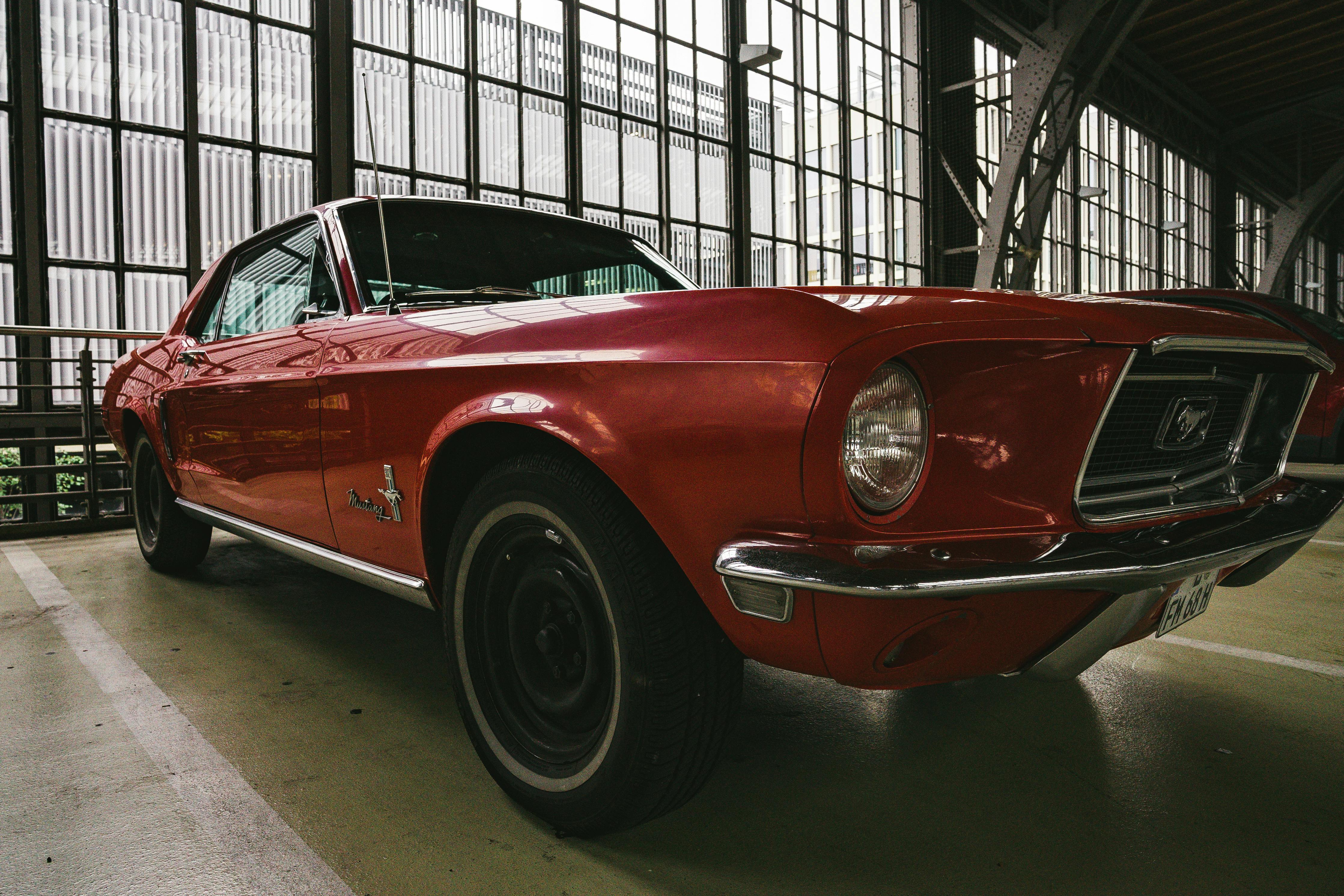 Close-Up Shot of a Red Mustang · Free Stock Photo