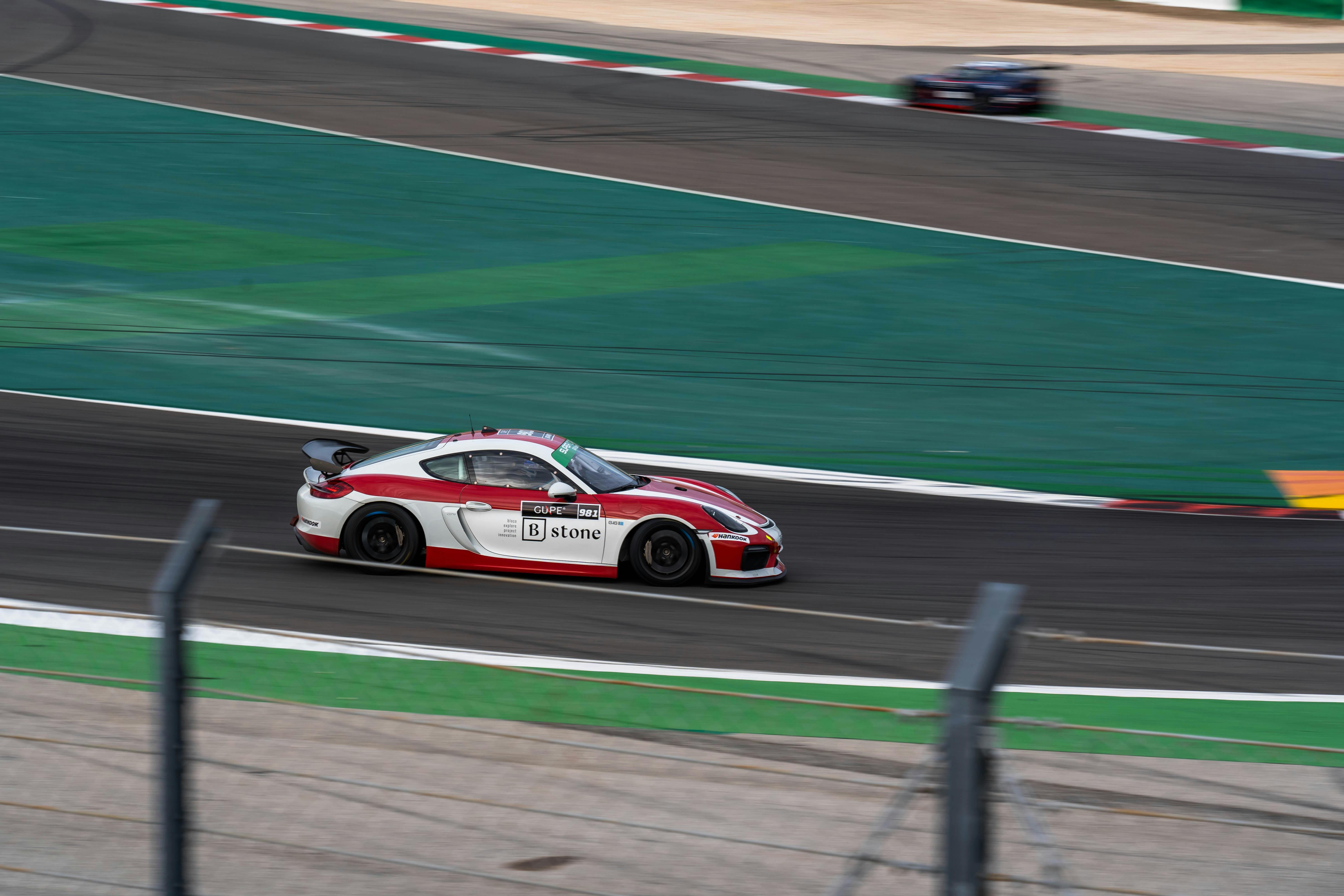 A Racecar on a Race Track · Free Stock Photo