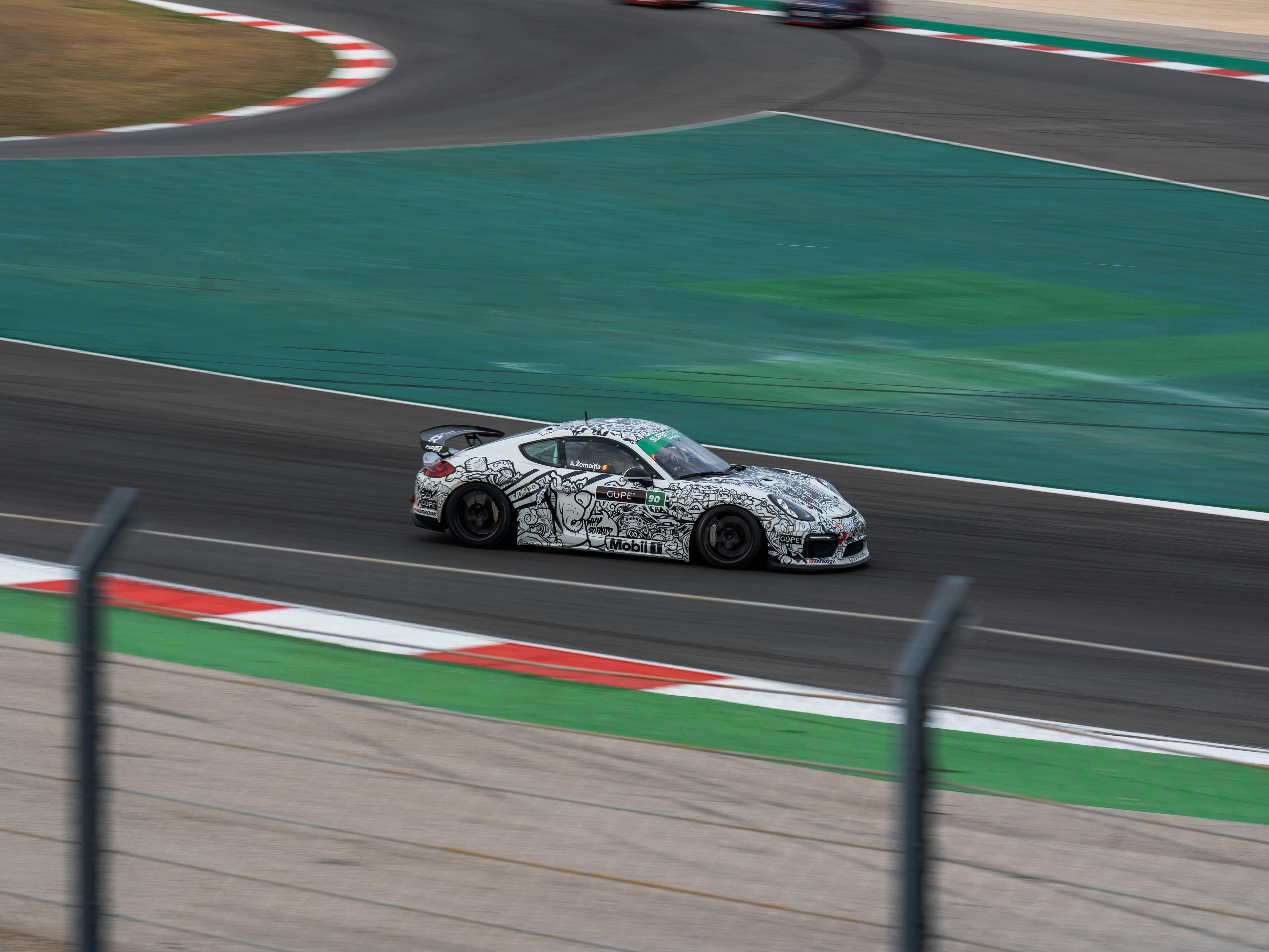 A Racecar on a Race Track · Free Stock Photo