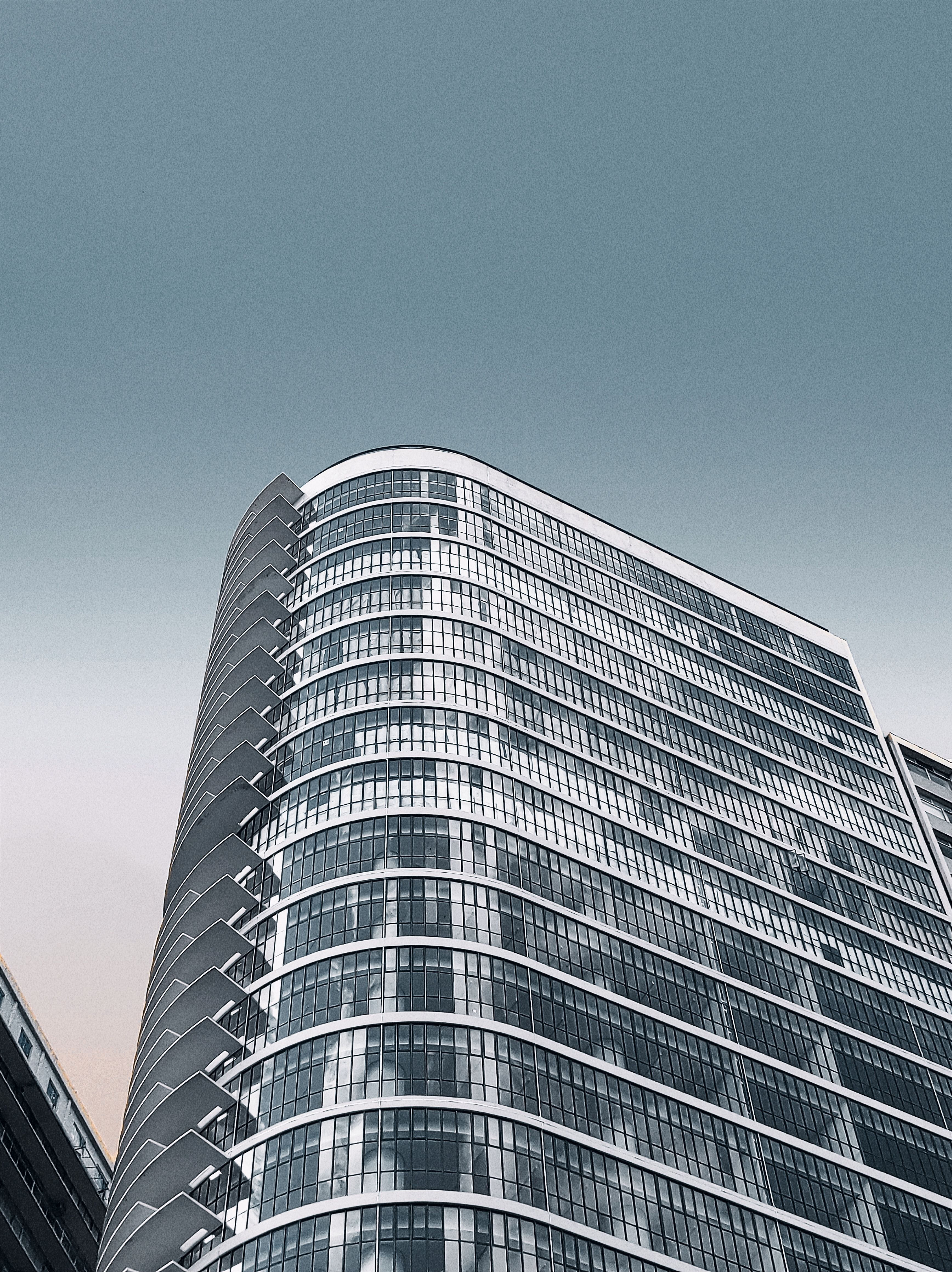 Glass Panels of High Rise Building Under the Sky · Free Stock Photo