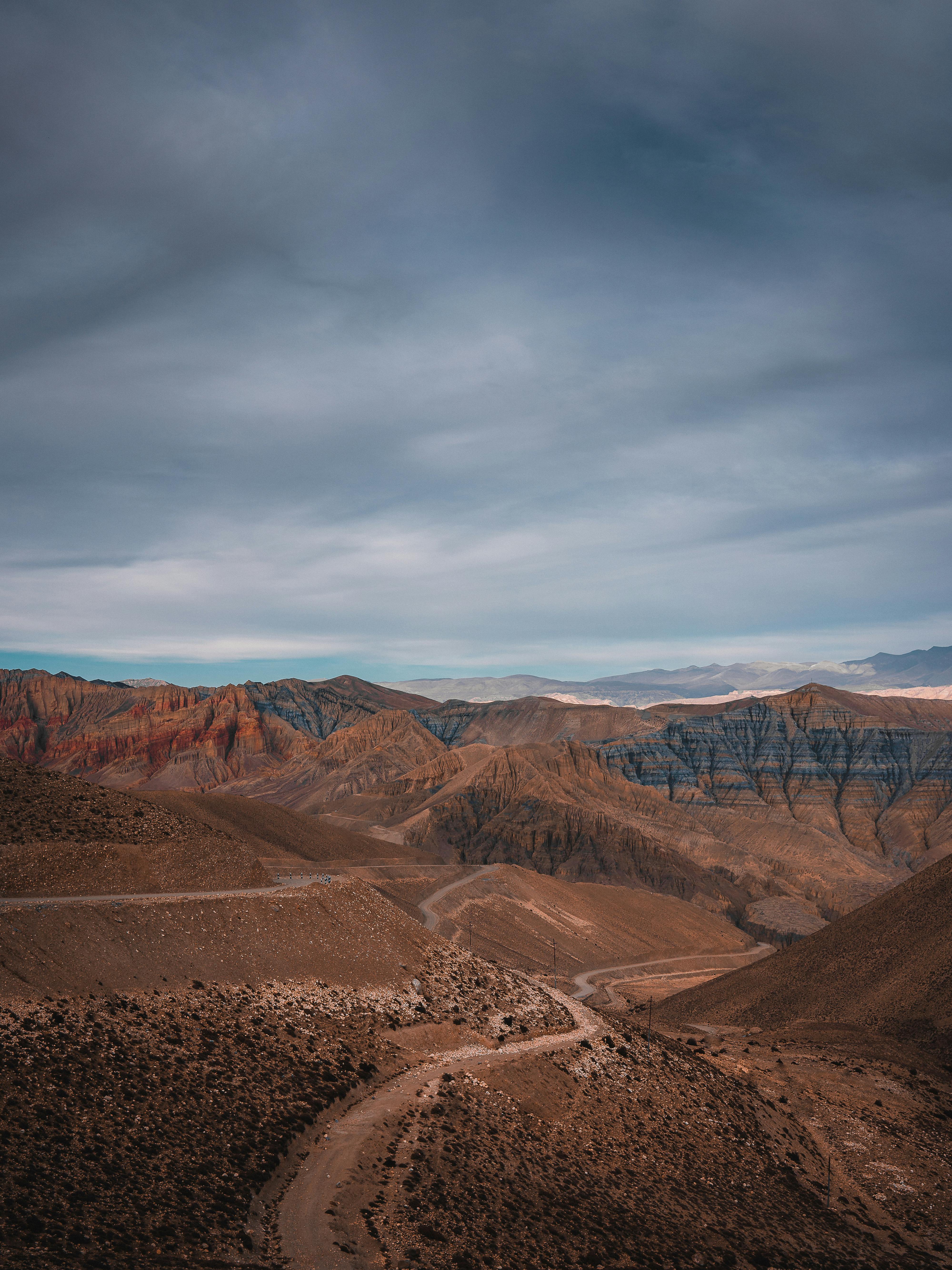 Body of Water Between 2 Mountains Under Clear Sky during Daytime · Free ...