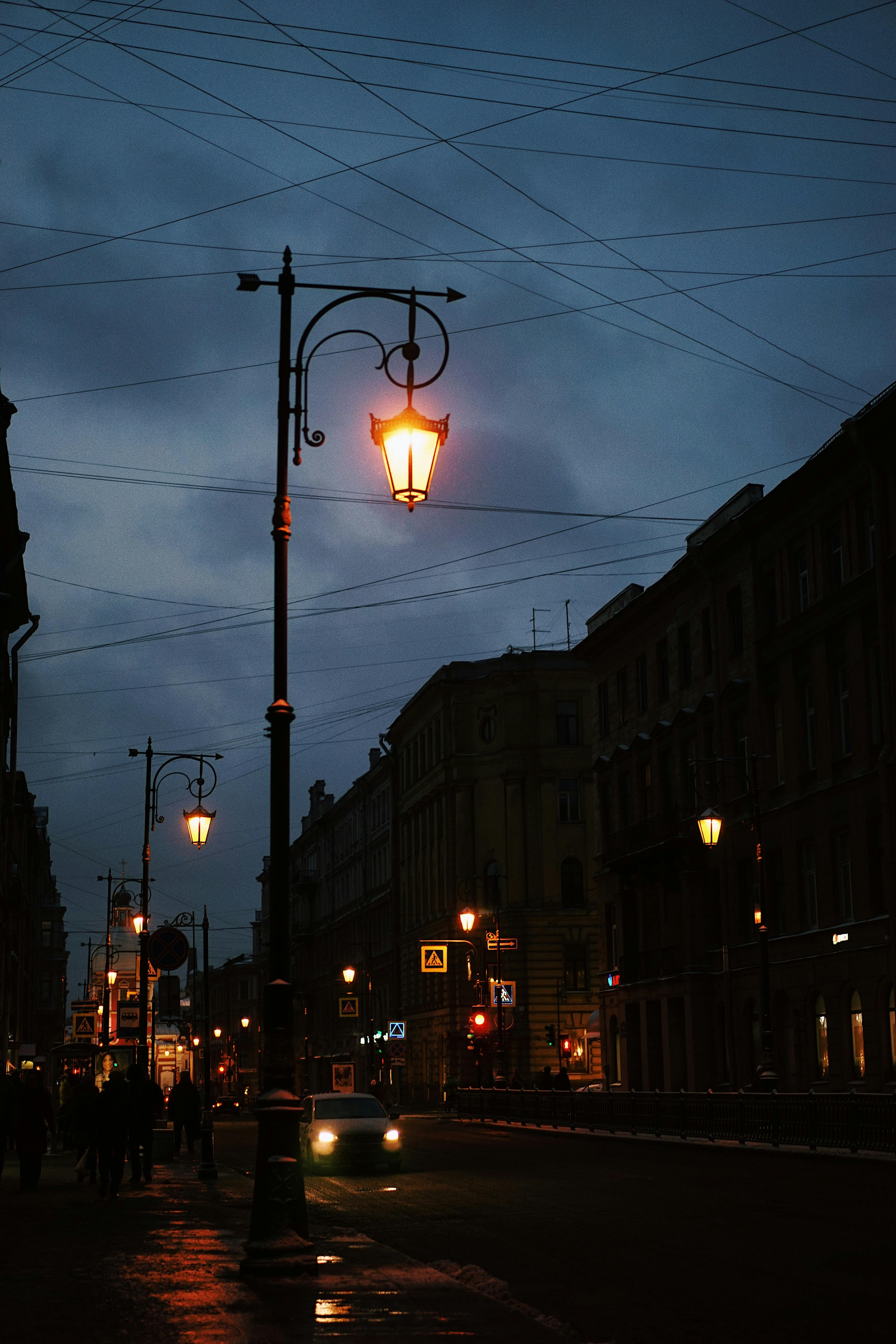 Street Lights near Buildings Illuminated at Night Time · Free Stock Photo
