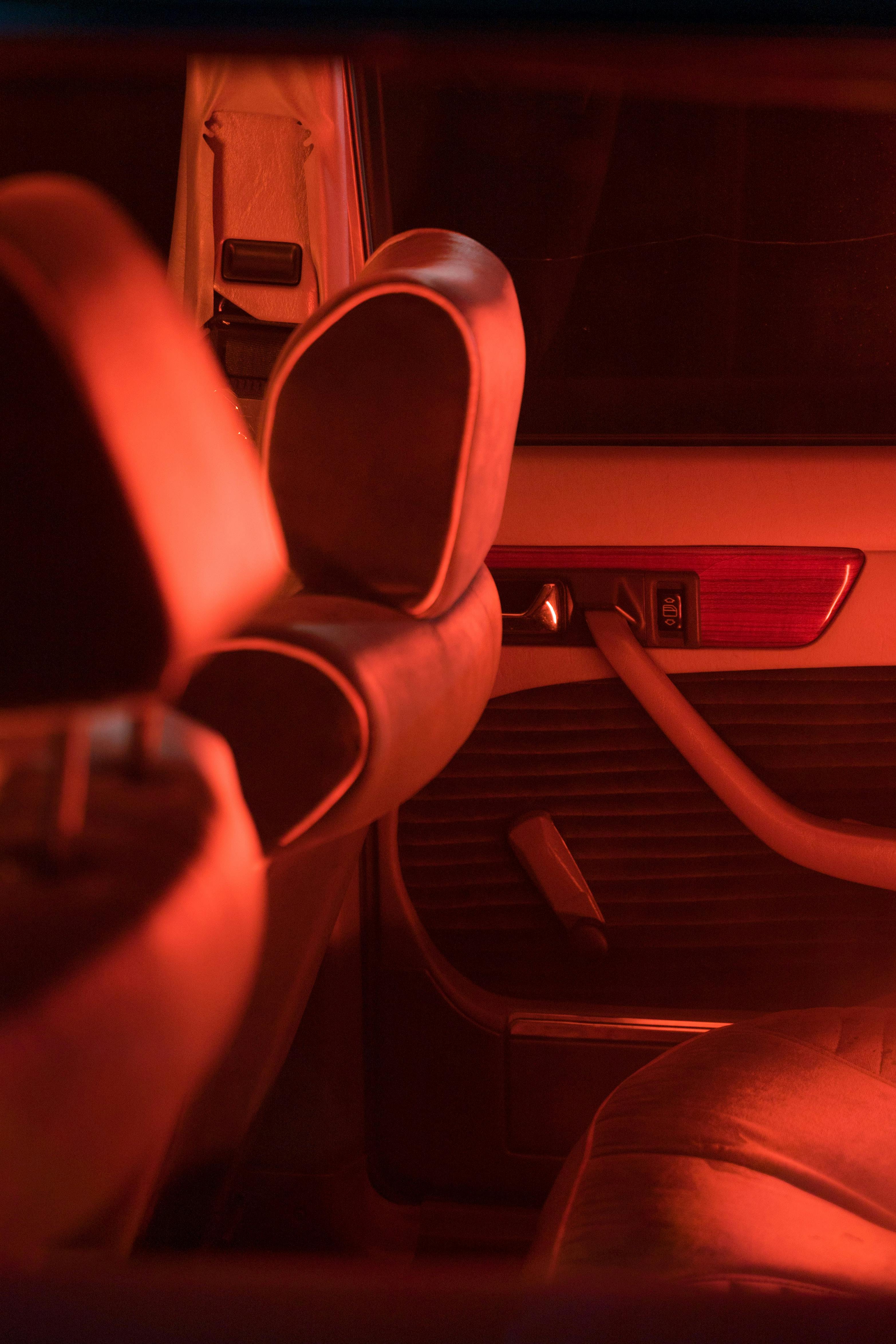 A Car Interior with Red Light · Free Stock Photo