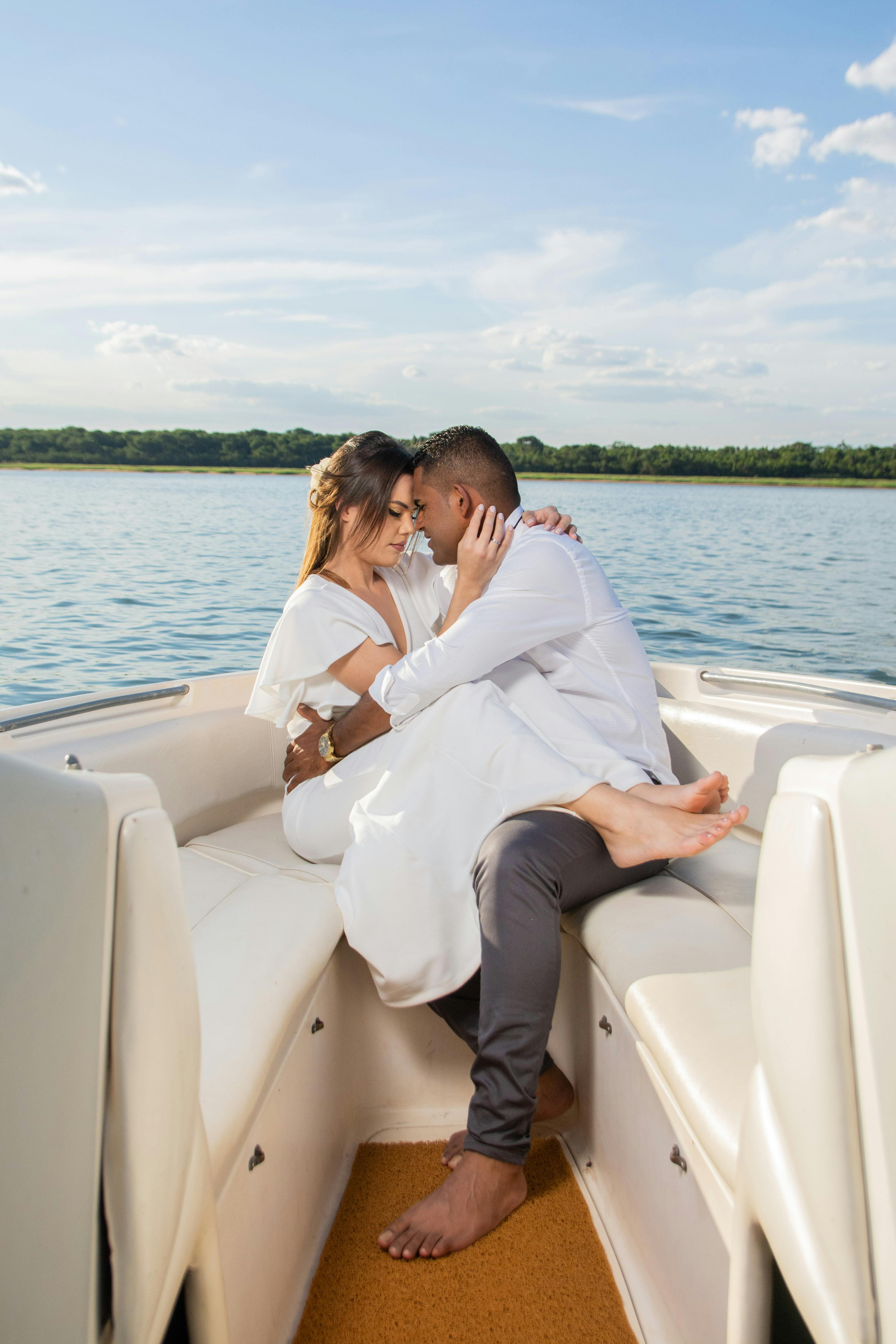 Intimate Couple on White Boat · Free Stock Photo