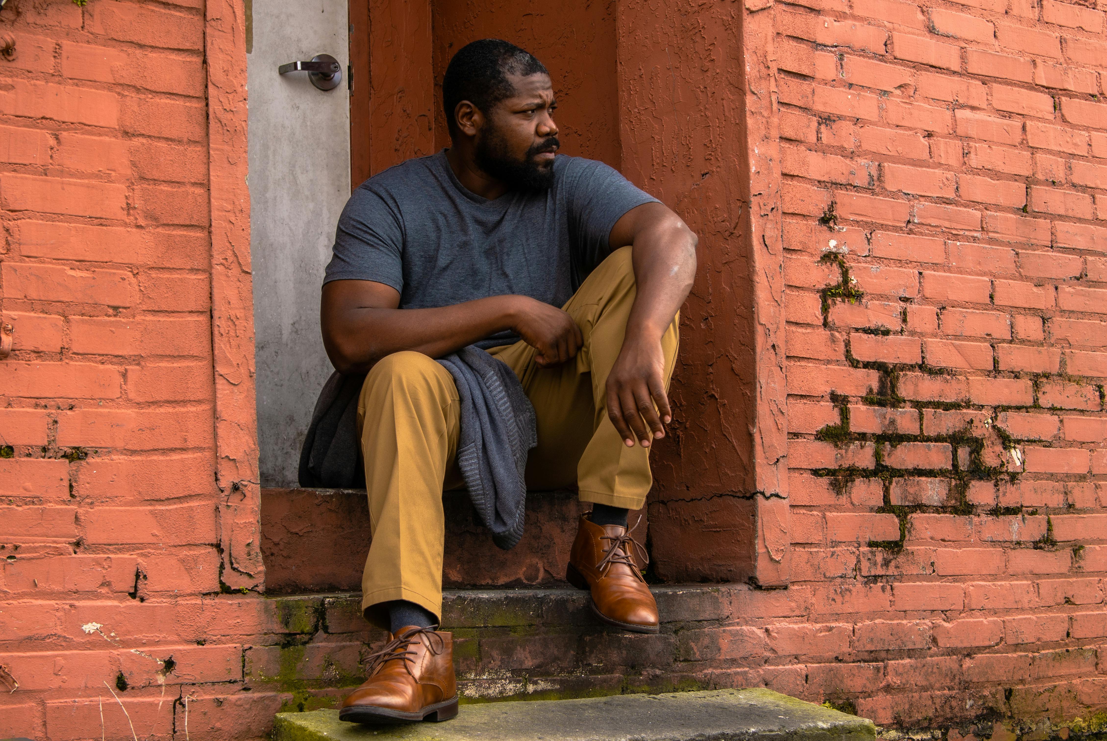 Photo Of Man Behind A Wall · Free Stock Photo