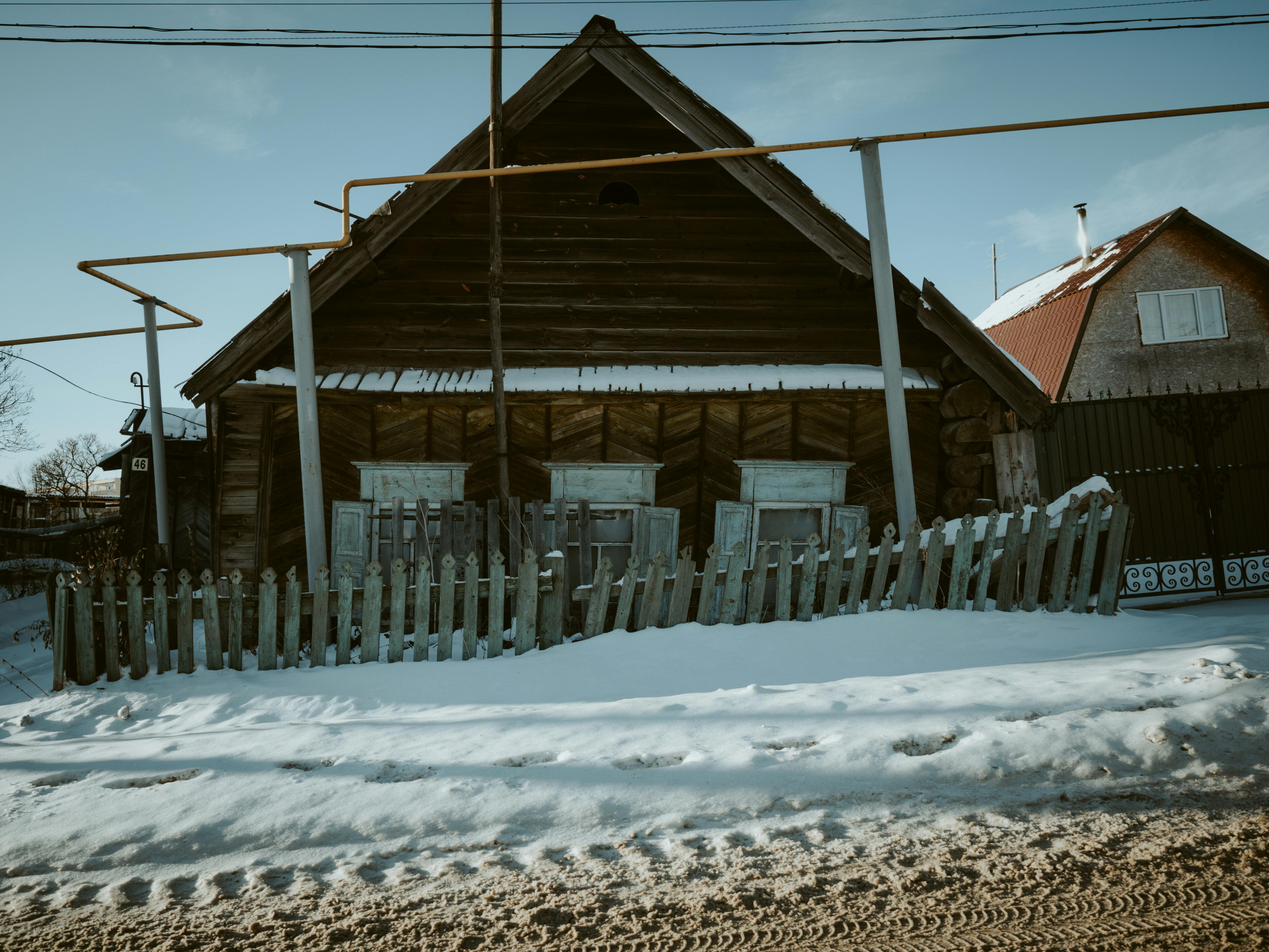Log Cabin on a Snow Covered Ground Near Trees during Winter · Free ...