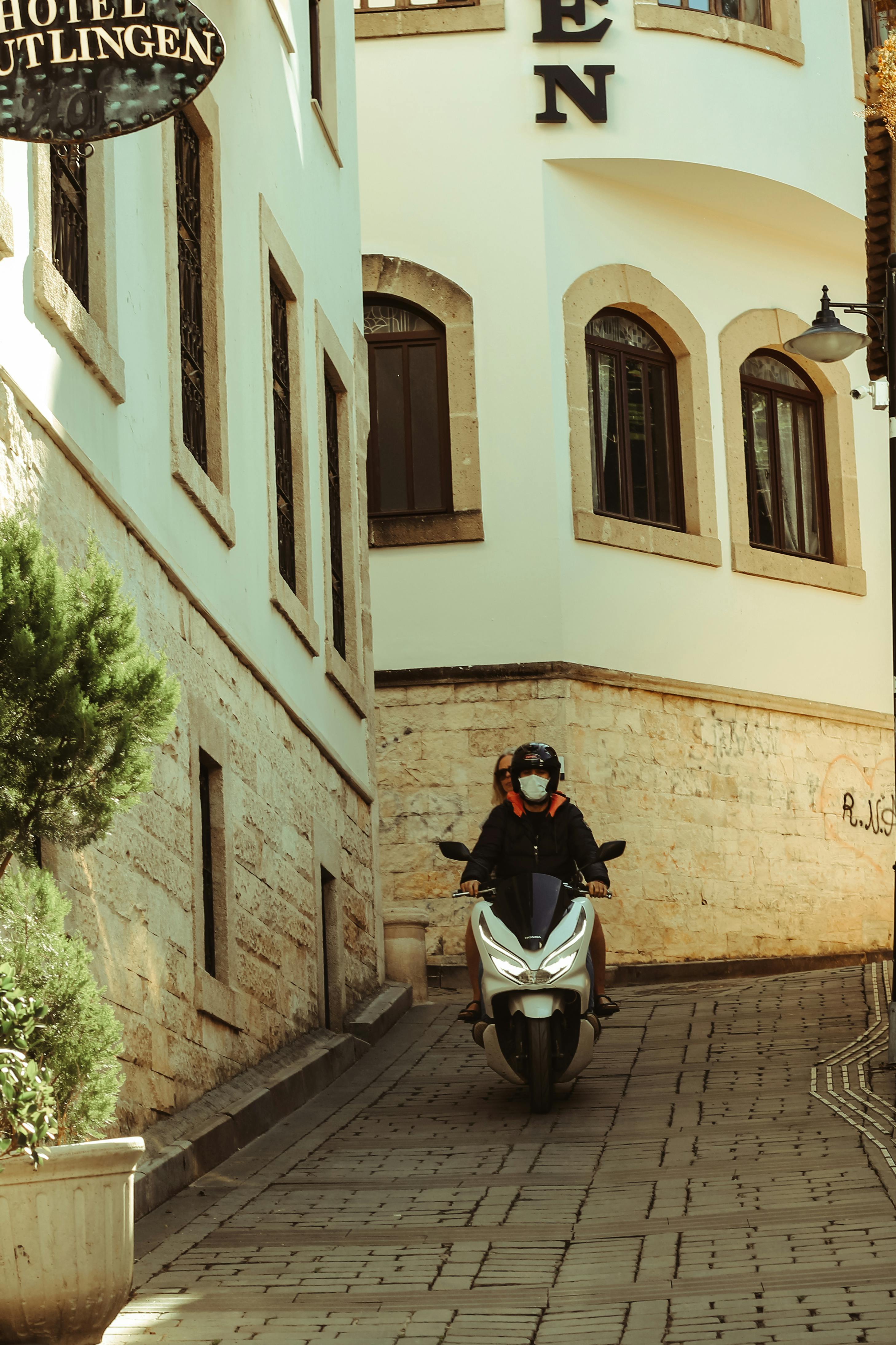 People Biking and Walking on Street · Free Stock Photo