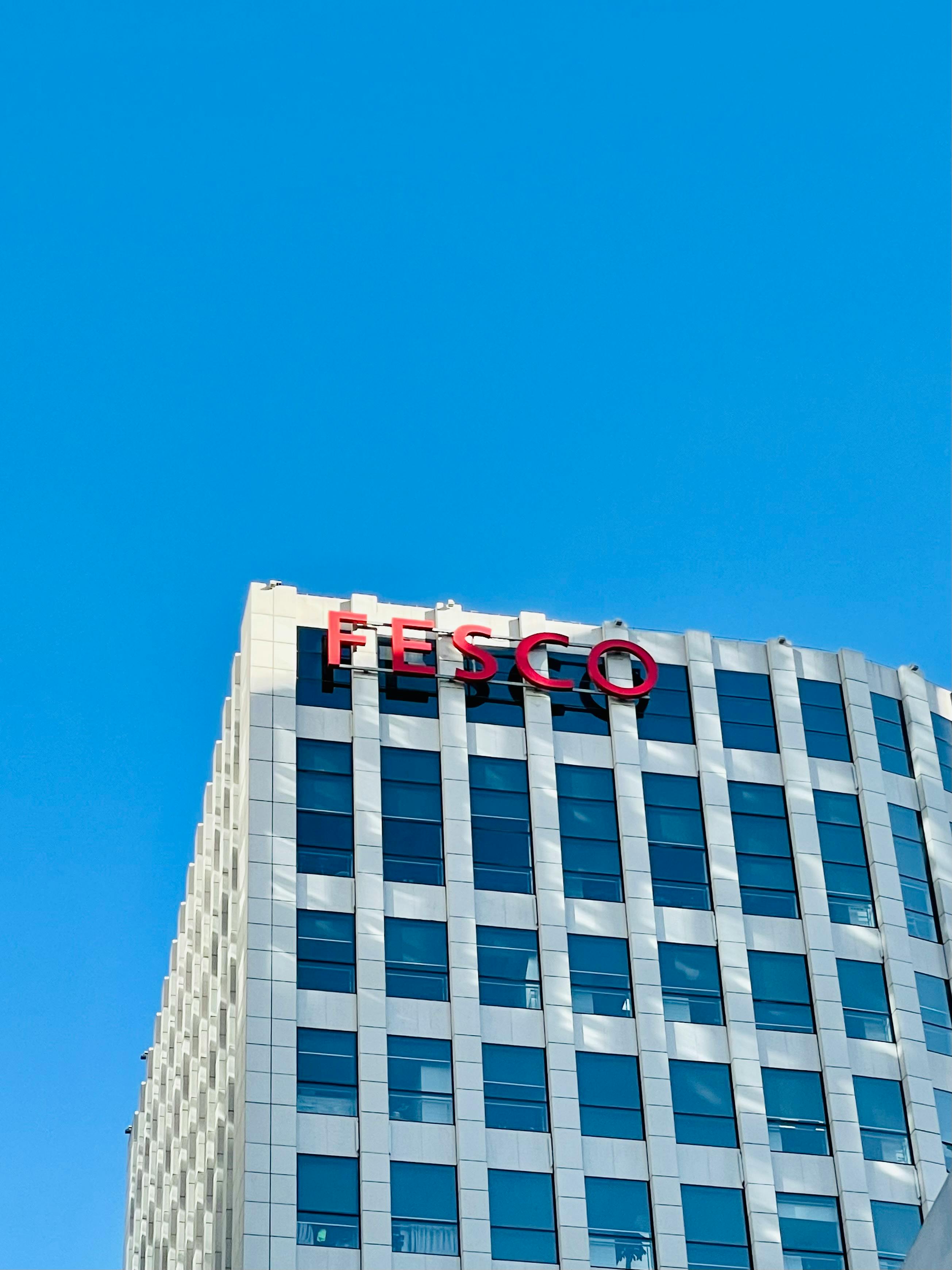 Fesco Building Under Blue Sky · Free Stock Photo