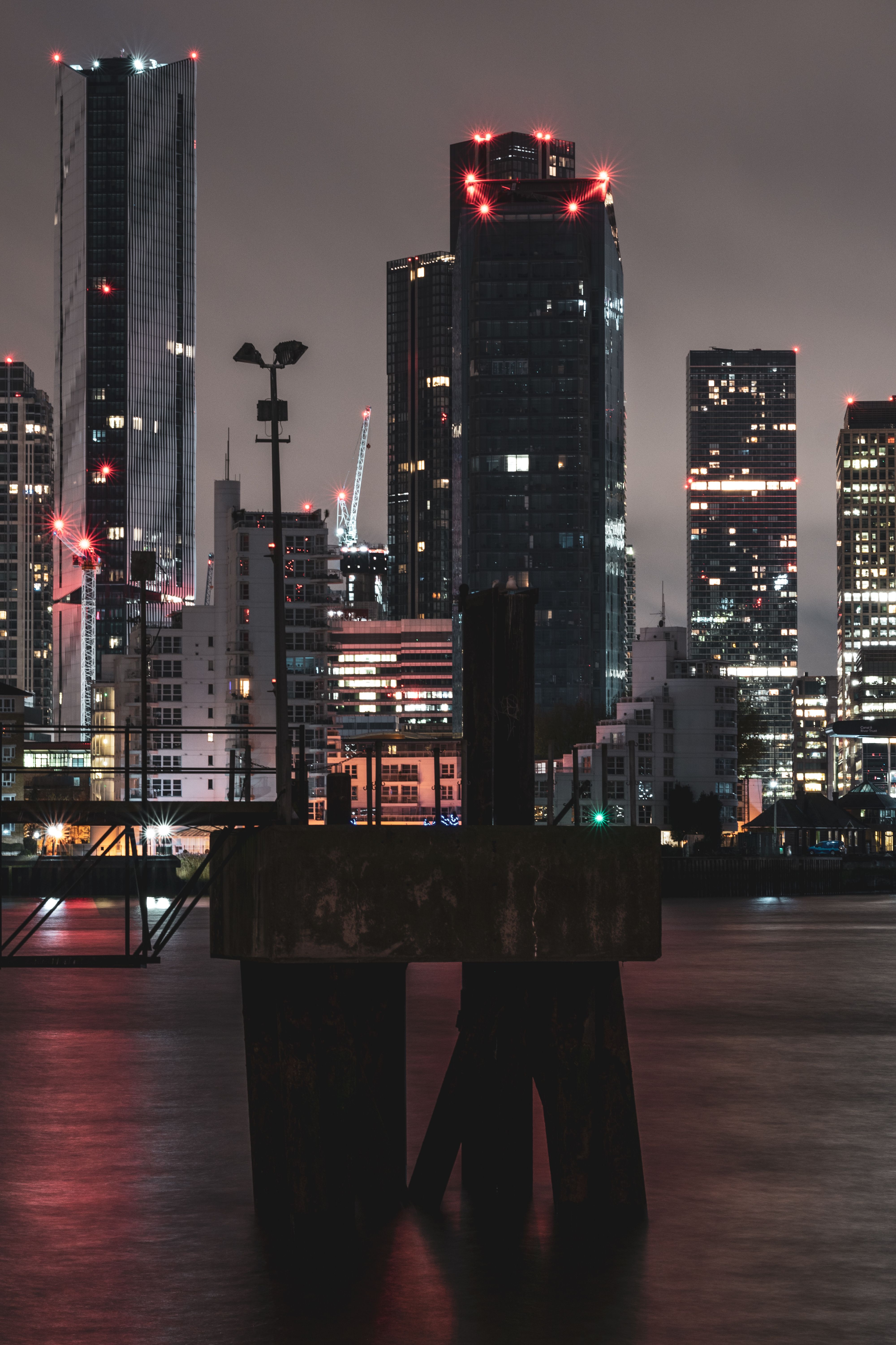 City Buildings Illuminated at Night Time · Free Stock Photo
