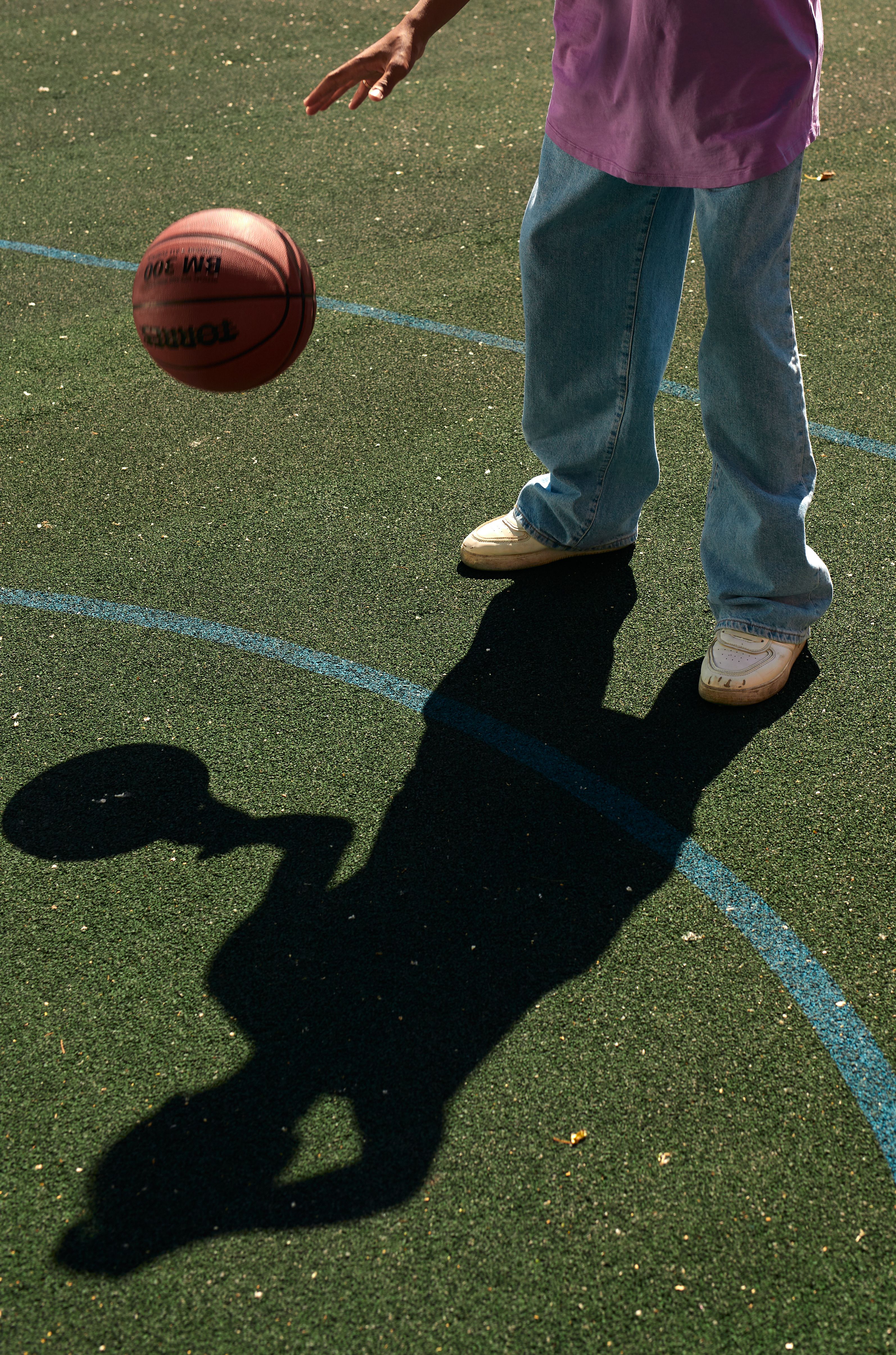 A Person Dribbling a Ball · Free Stock Photo