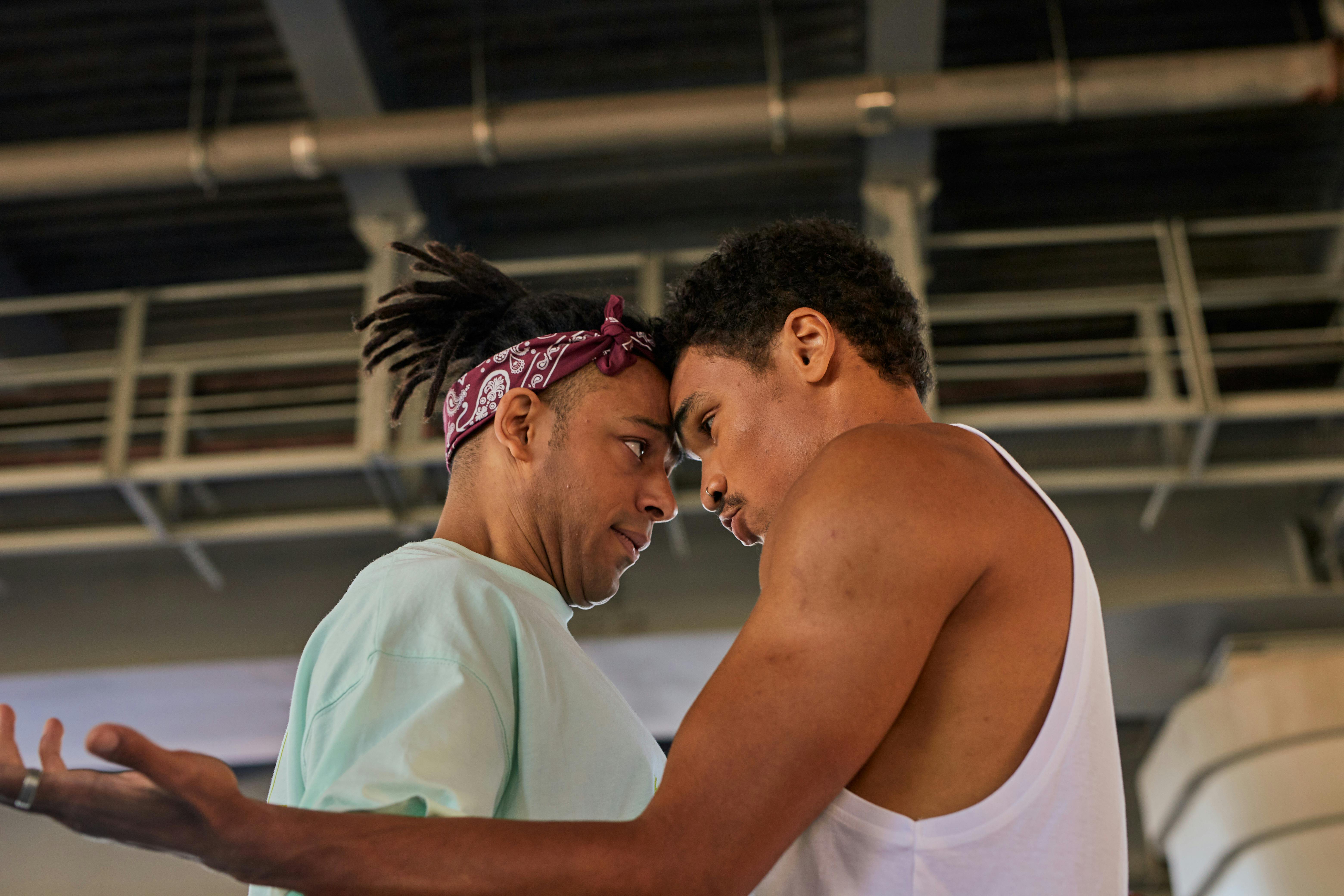 Staring Contest Between Two Men Under a Bridge · Free Stock Photo