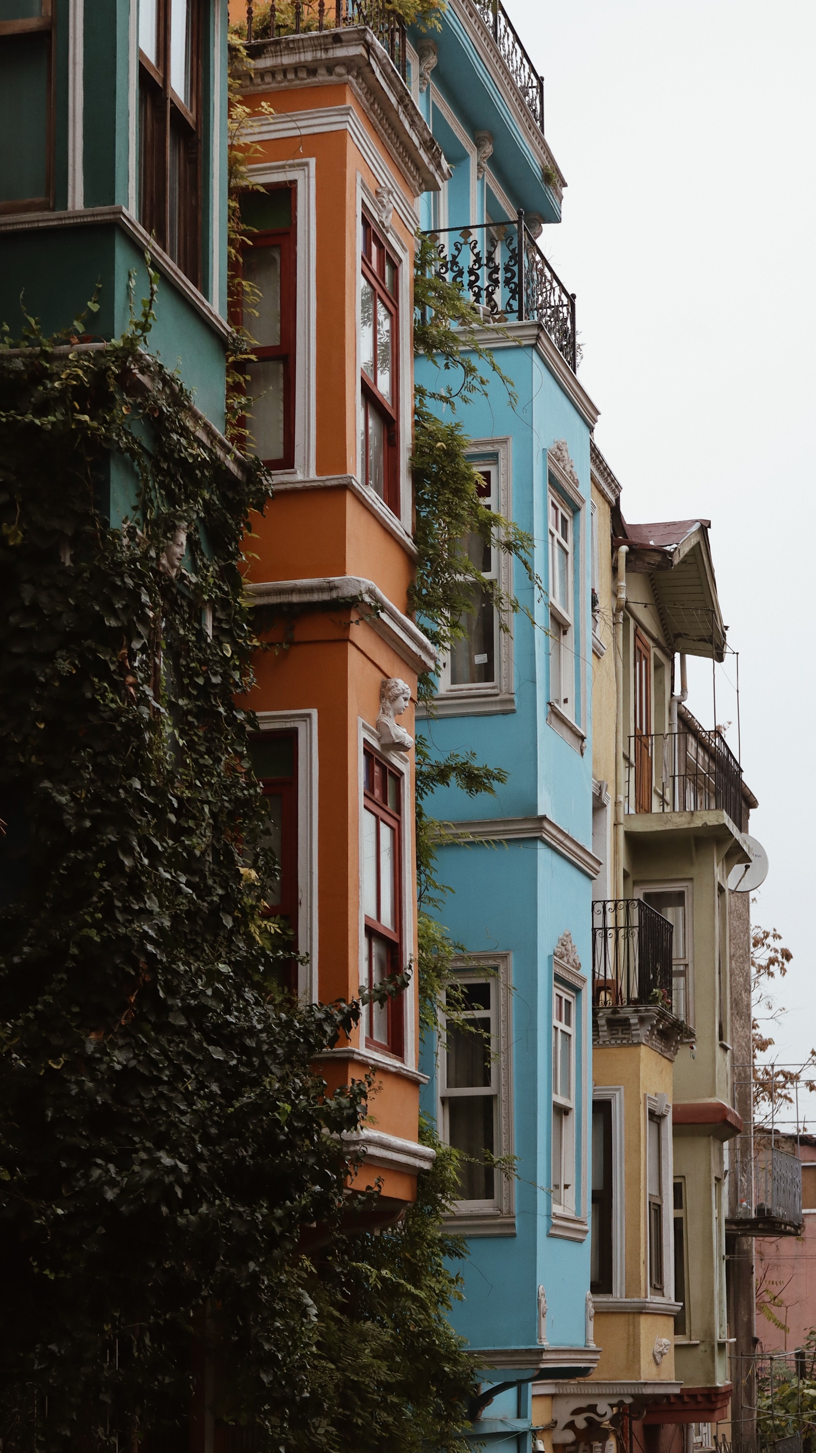 Apartment Building Exterior Painted with Pastel Colors · Free Stock Photo