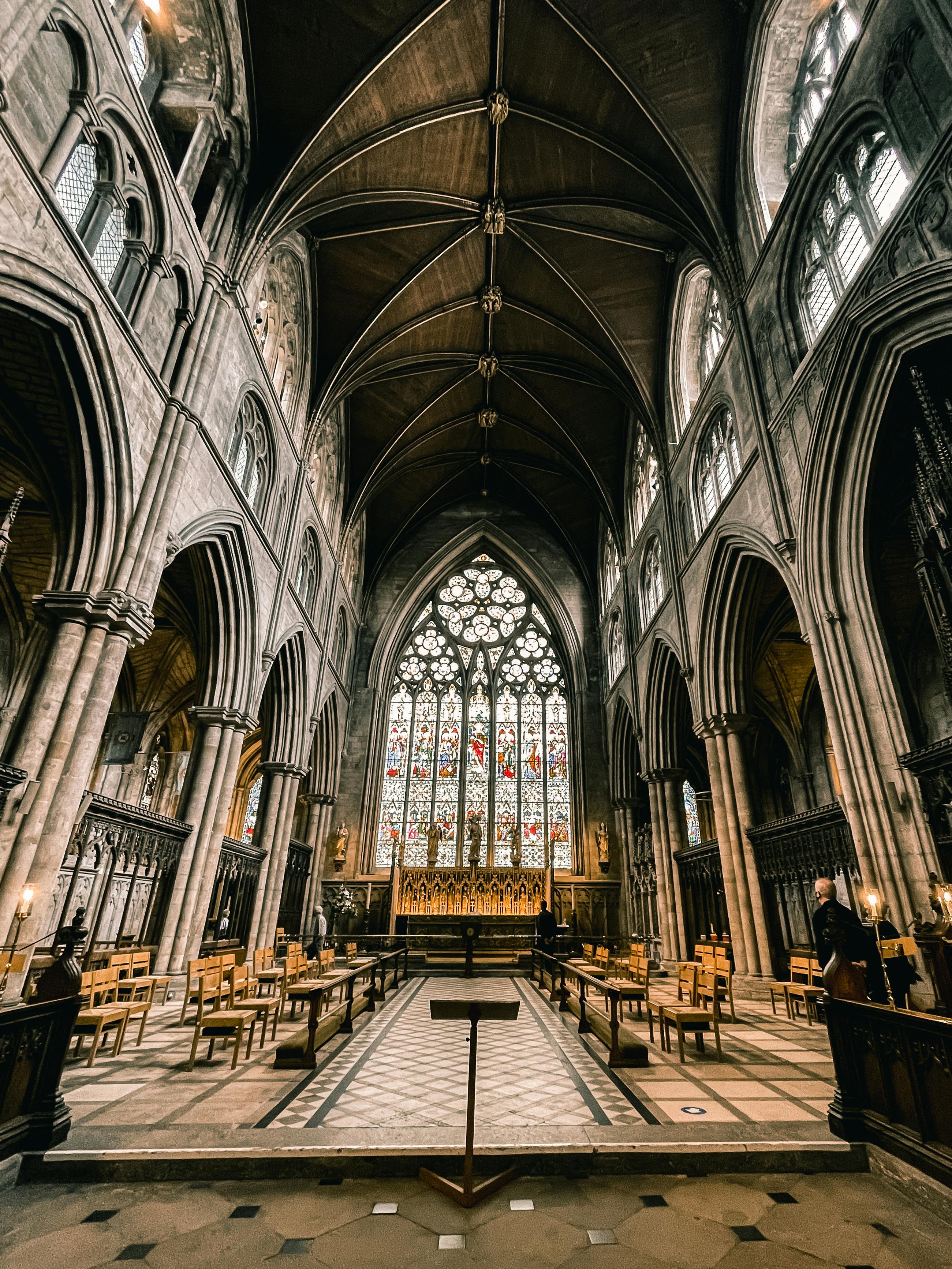 Arched ceiling with stained glass windows in cathedral · Free Stock Photo