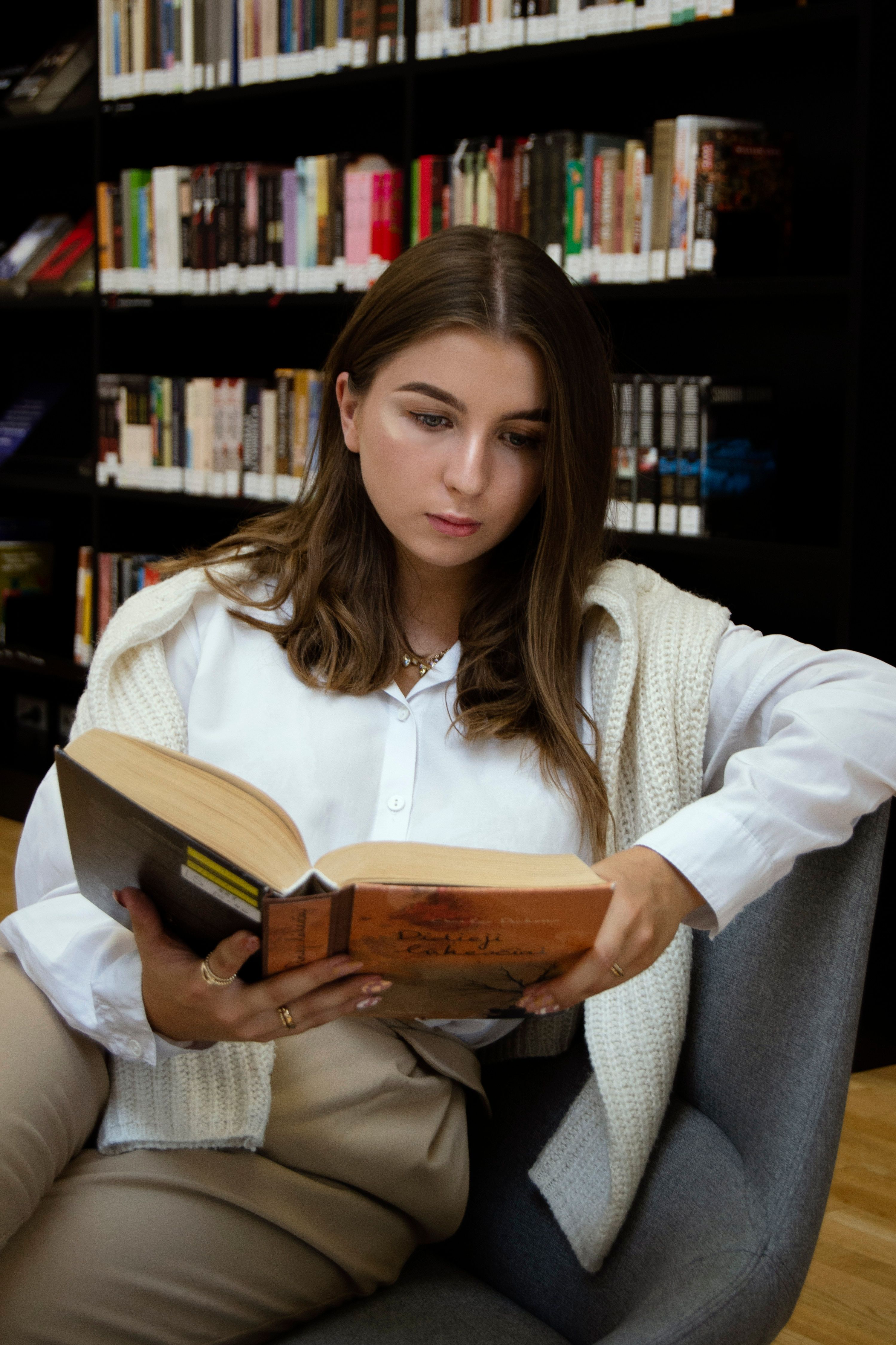 A Woman Reading a Book · Free Stock Photo