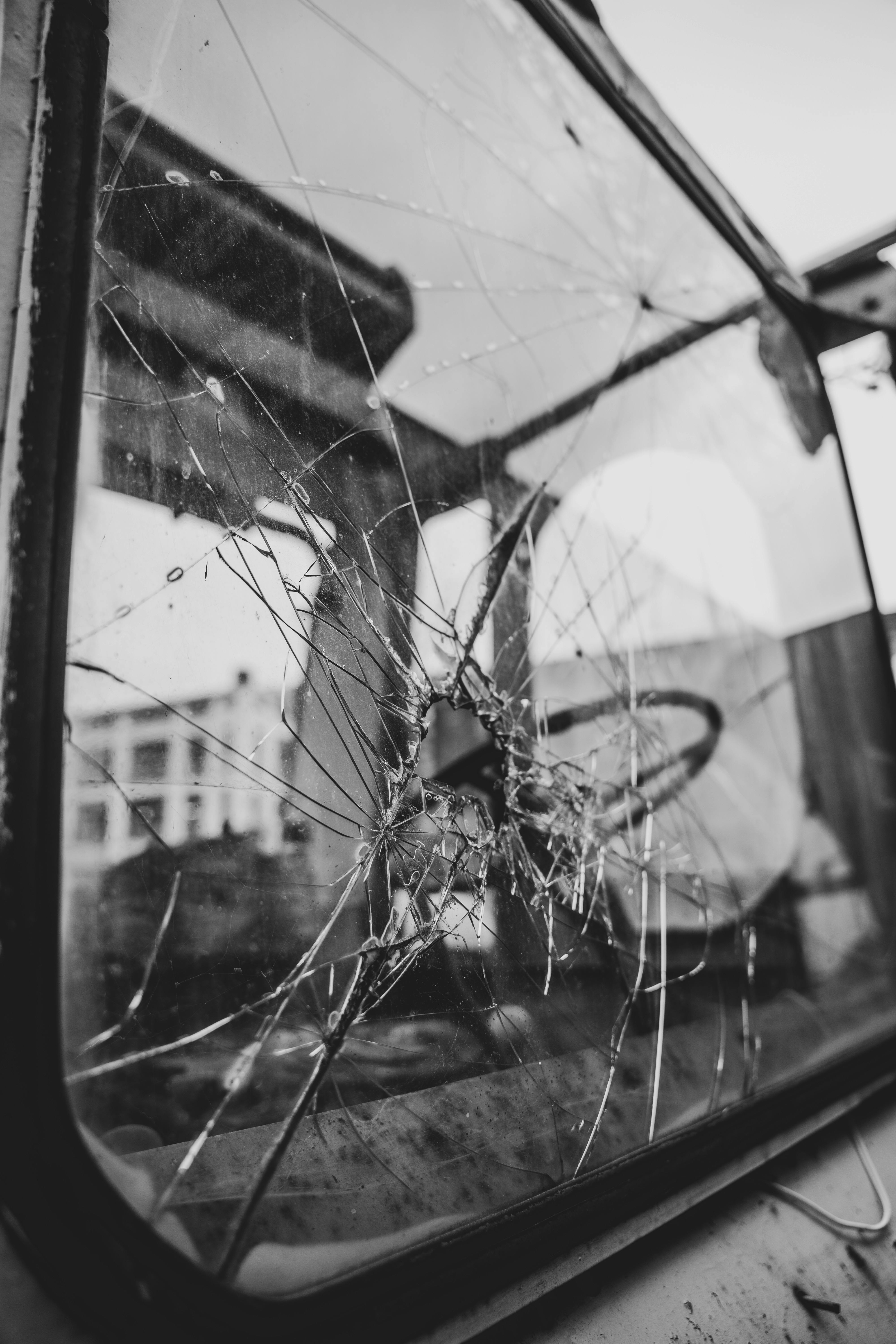 Close-up of a Smashed Bus Windshield · Free Stock Photo