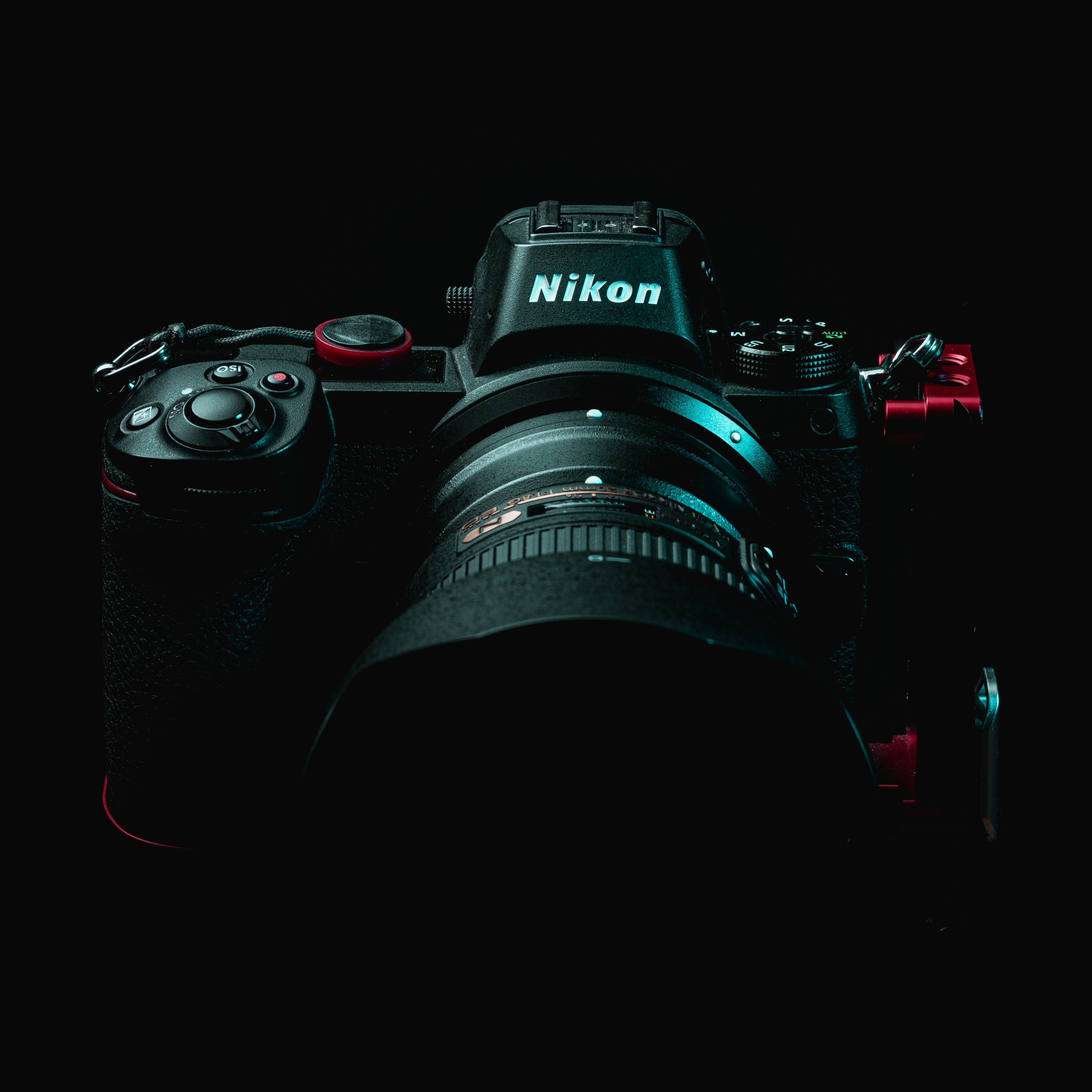 A Close-Up Shot of a Nikon Camera · Free Stock Photo