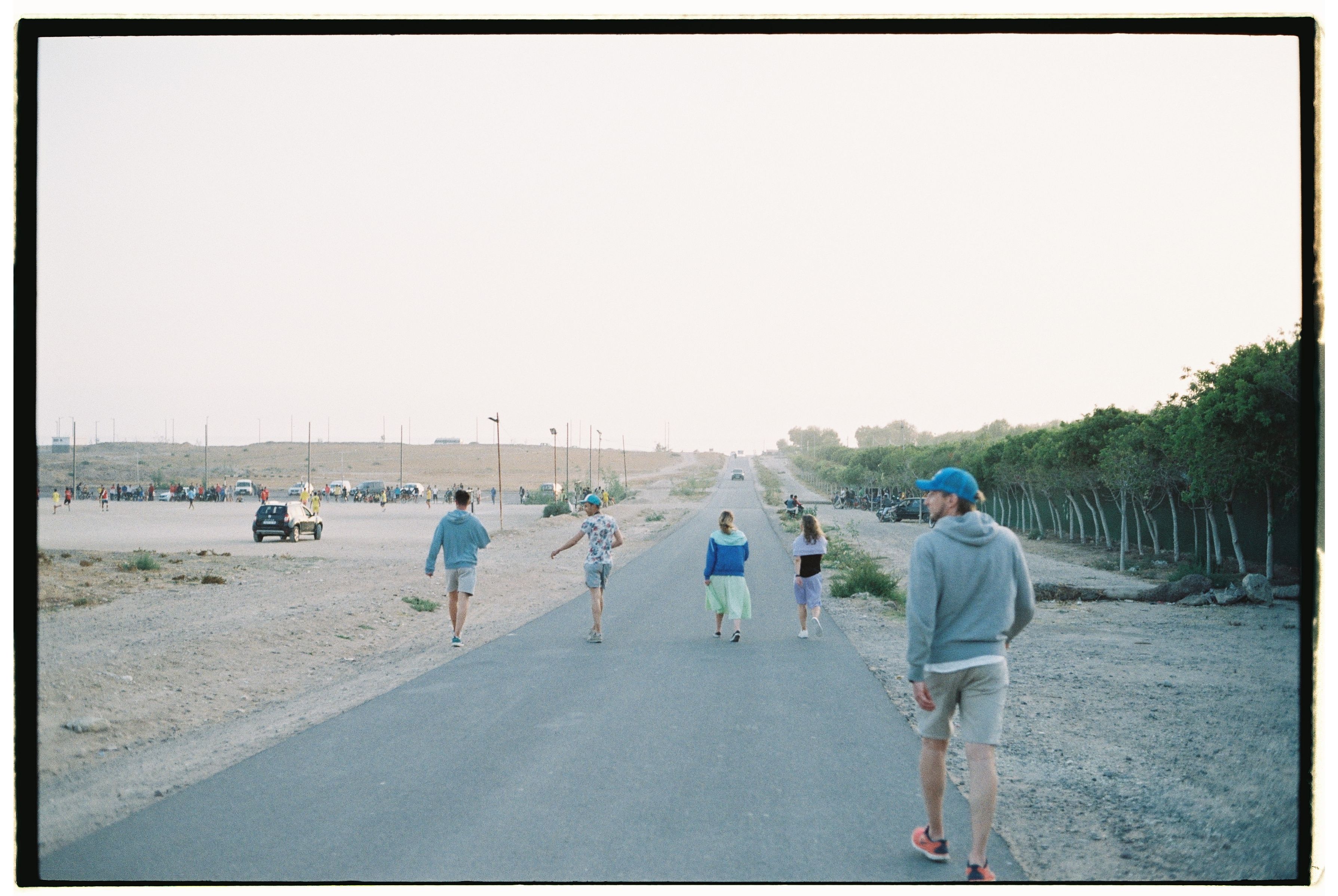 Group of Friends Looking on a Map · Free Stock Photo