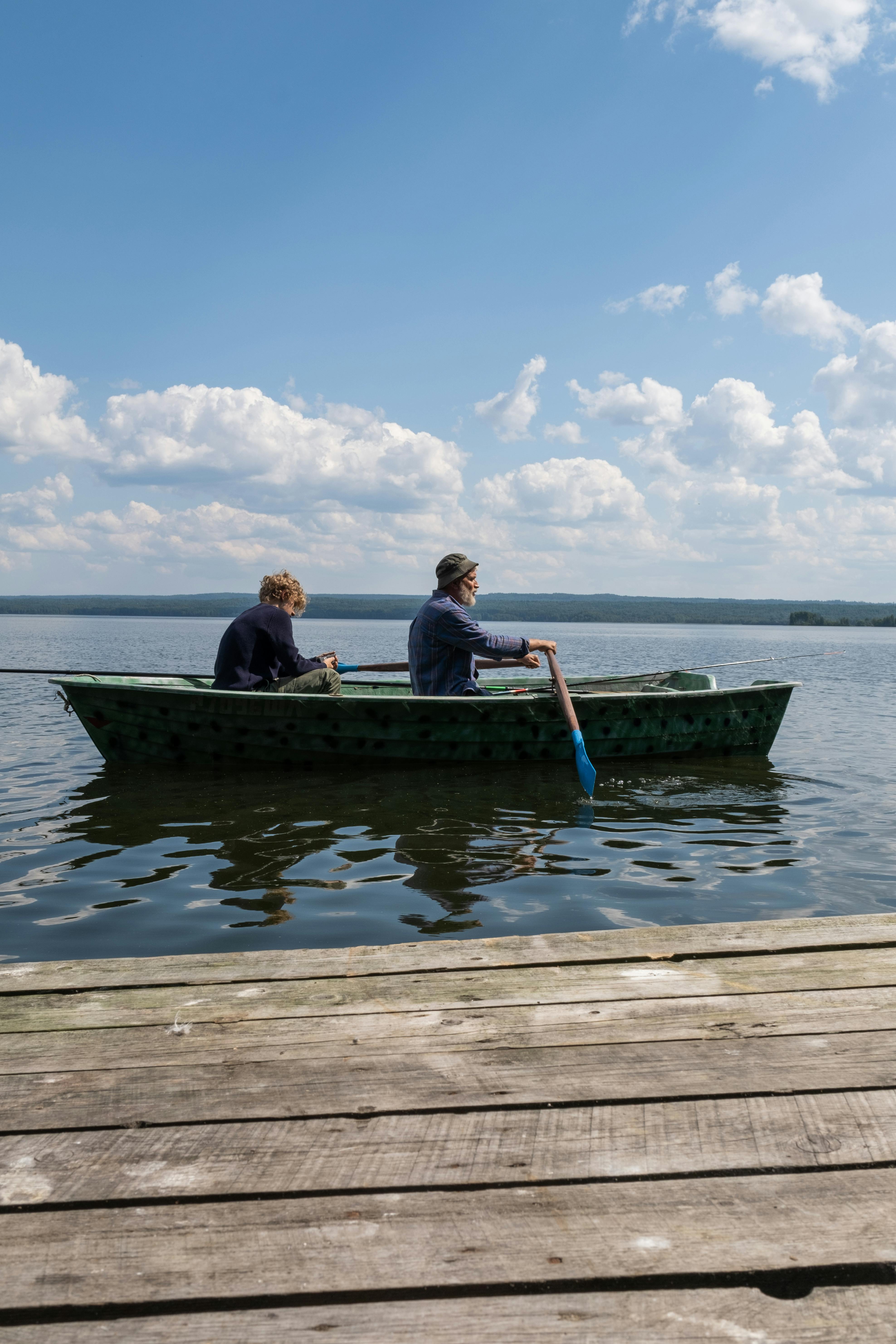 Men Inside a Rowing Boat · Free Stock Photo