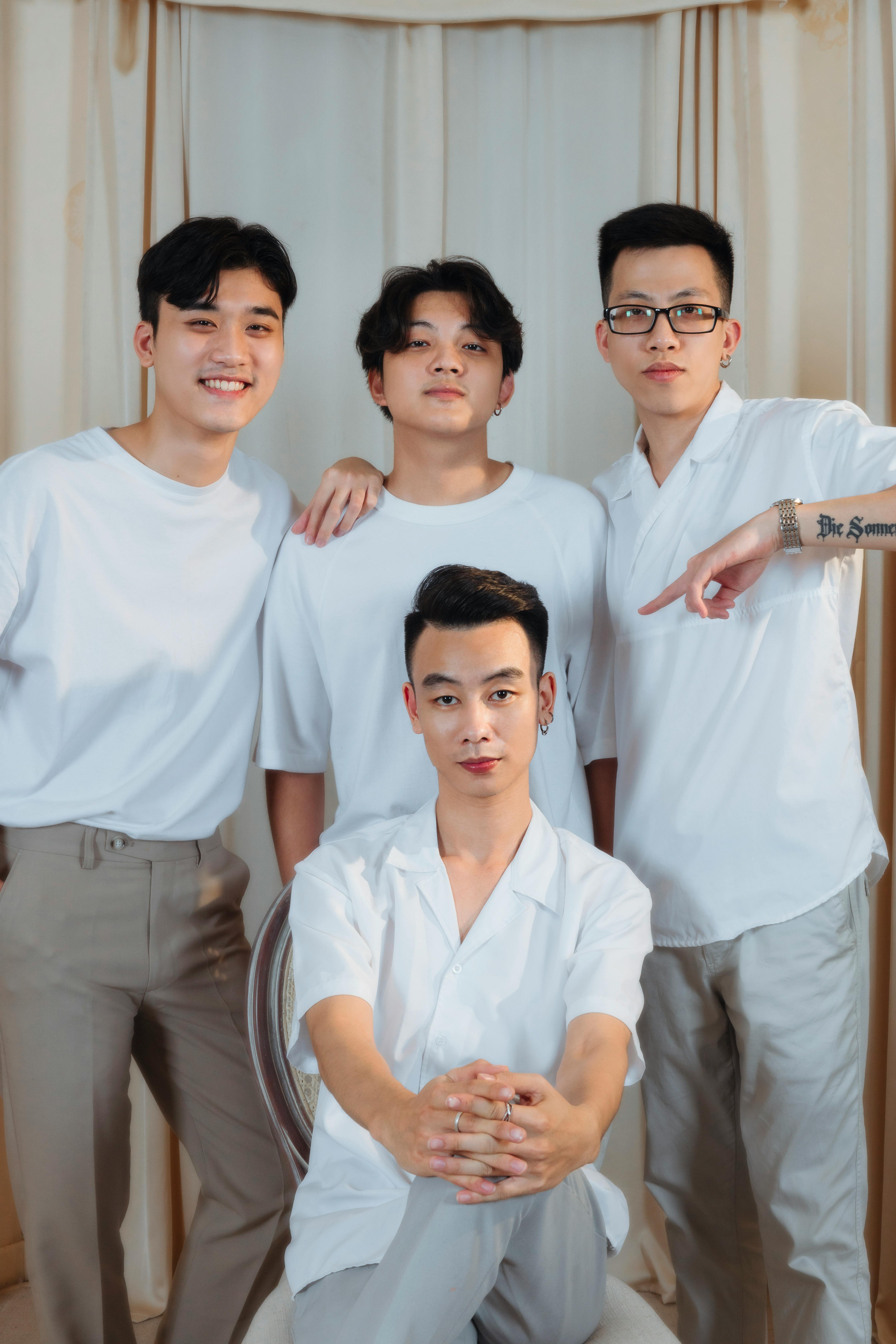 Group of Men Posing Together · Free Stock Photo