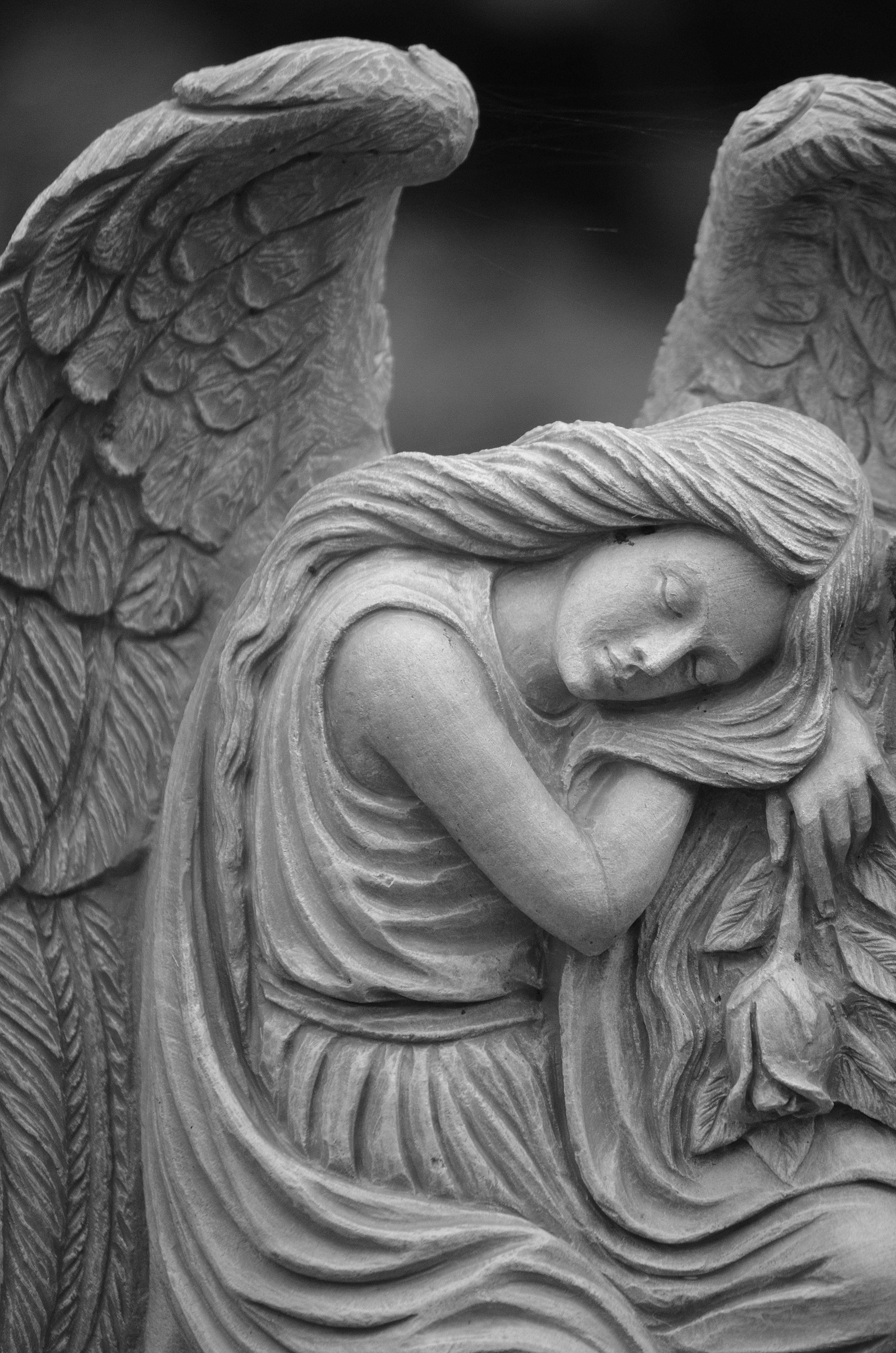 Grayscale Photo of an Angel Statue · Free Stock Photo
