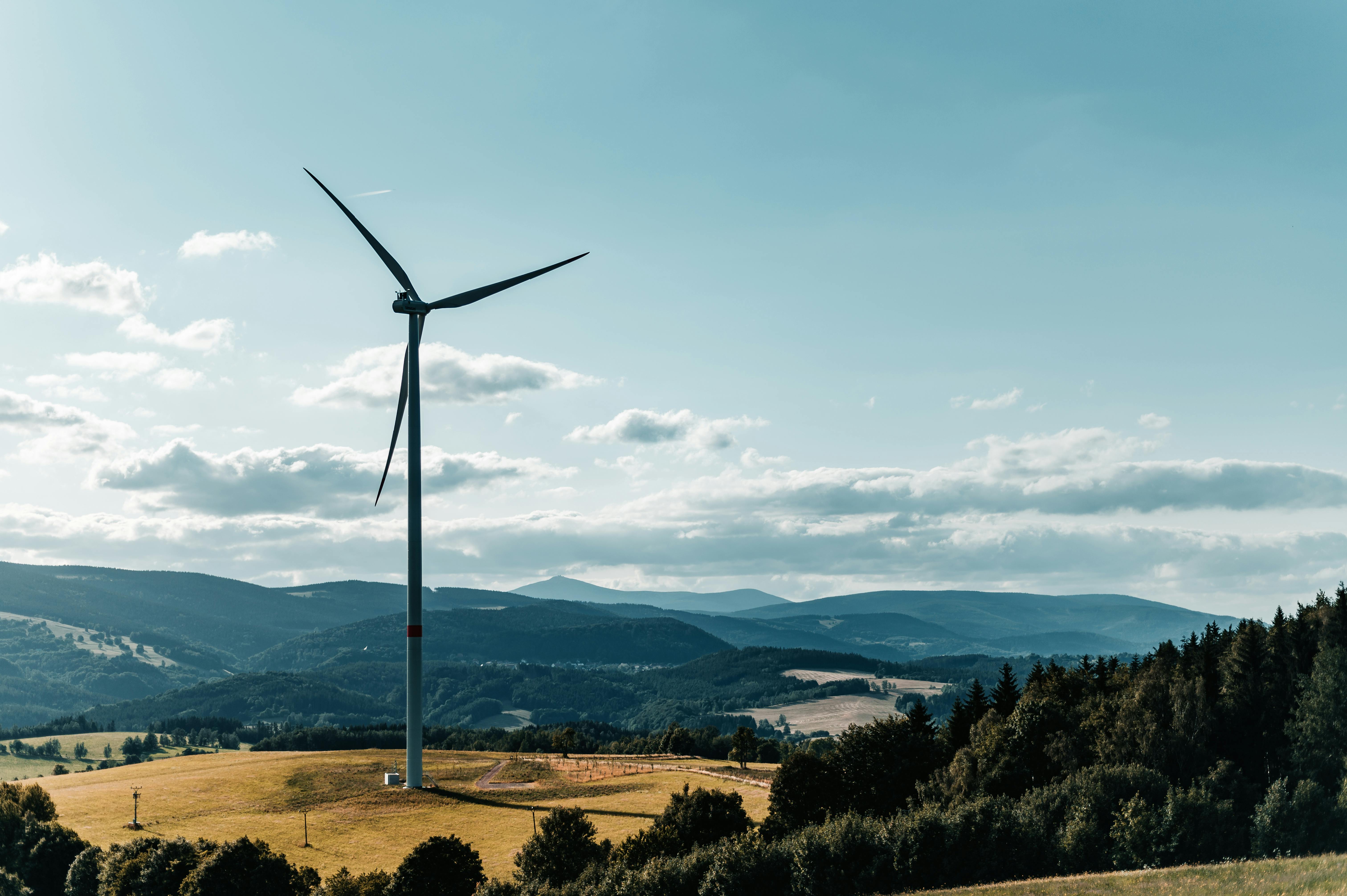 Windmill on Mountain Area under Clear Sky · Free Stock Photo