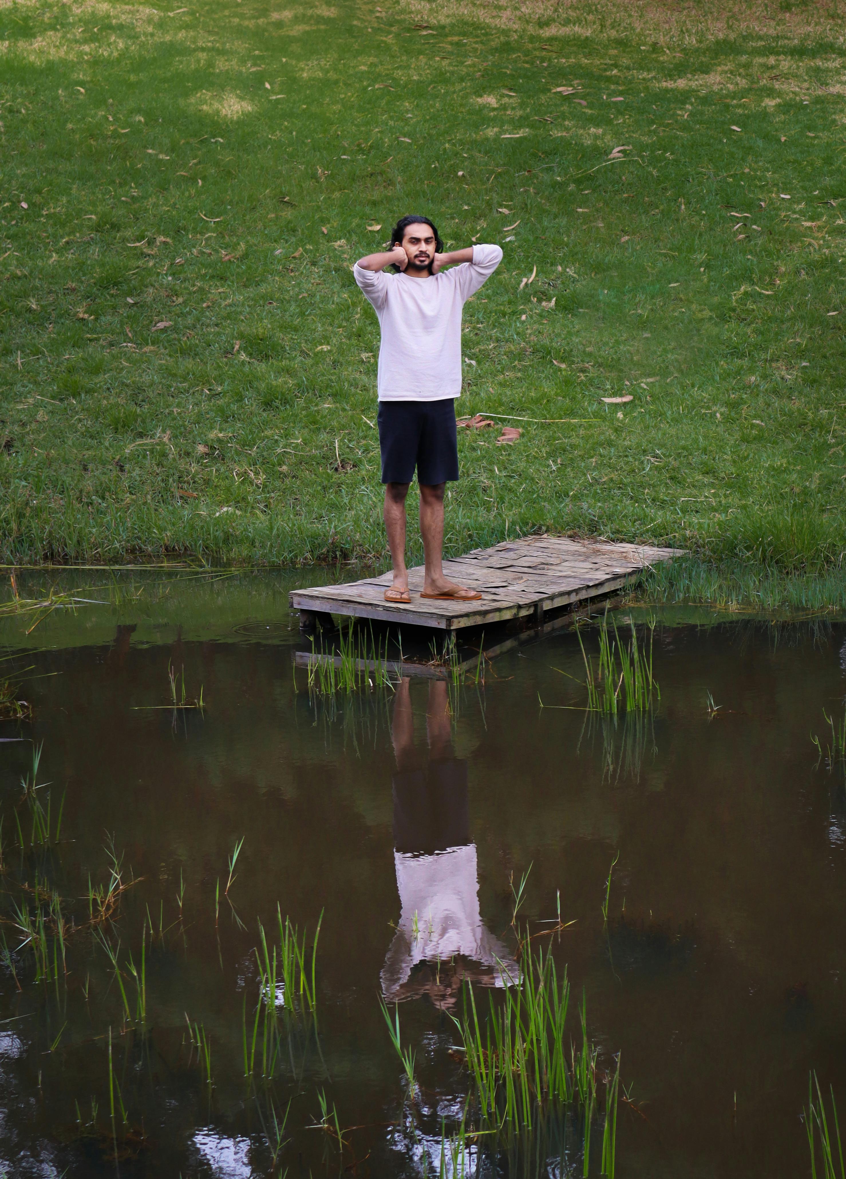 Reflection of a Person on the Water · Free Stock Photo