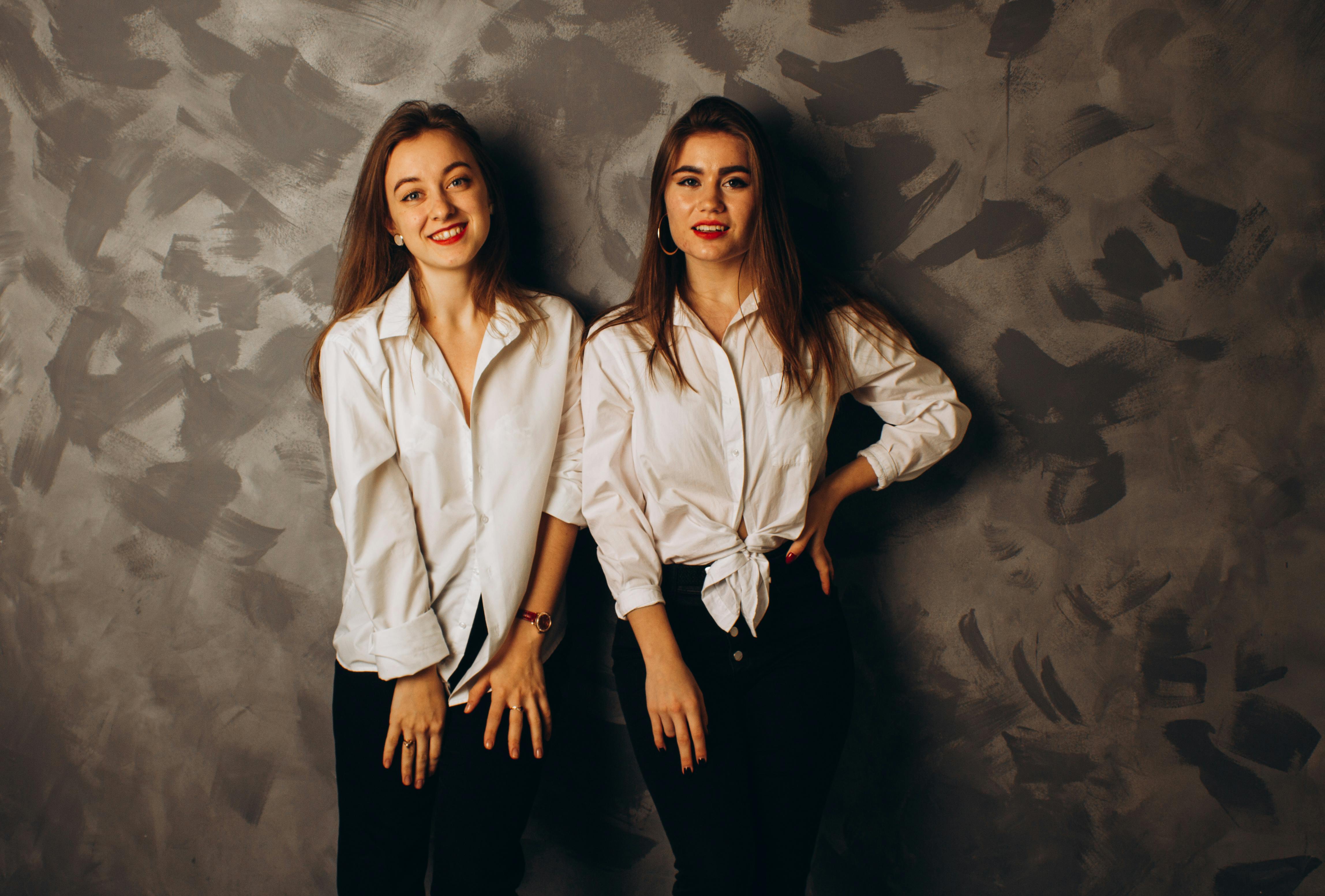 Two Women Smiling Together · Free Stock Photo