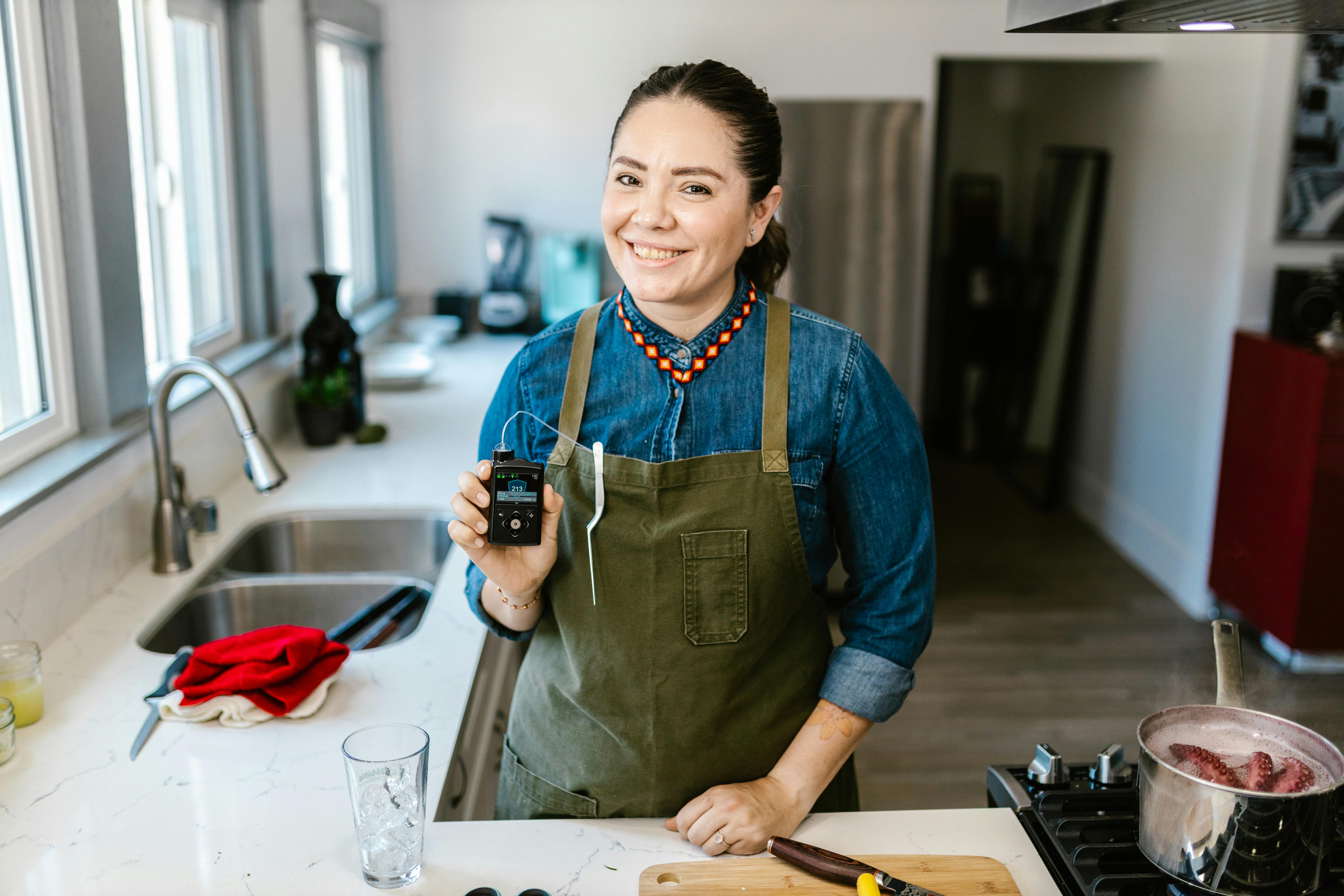 Woman With Black Hair in Kitchen · Free Stock Photo