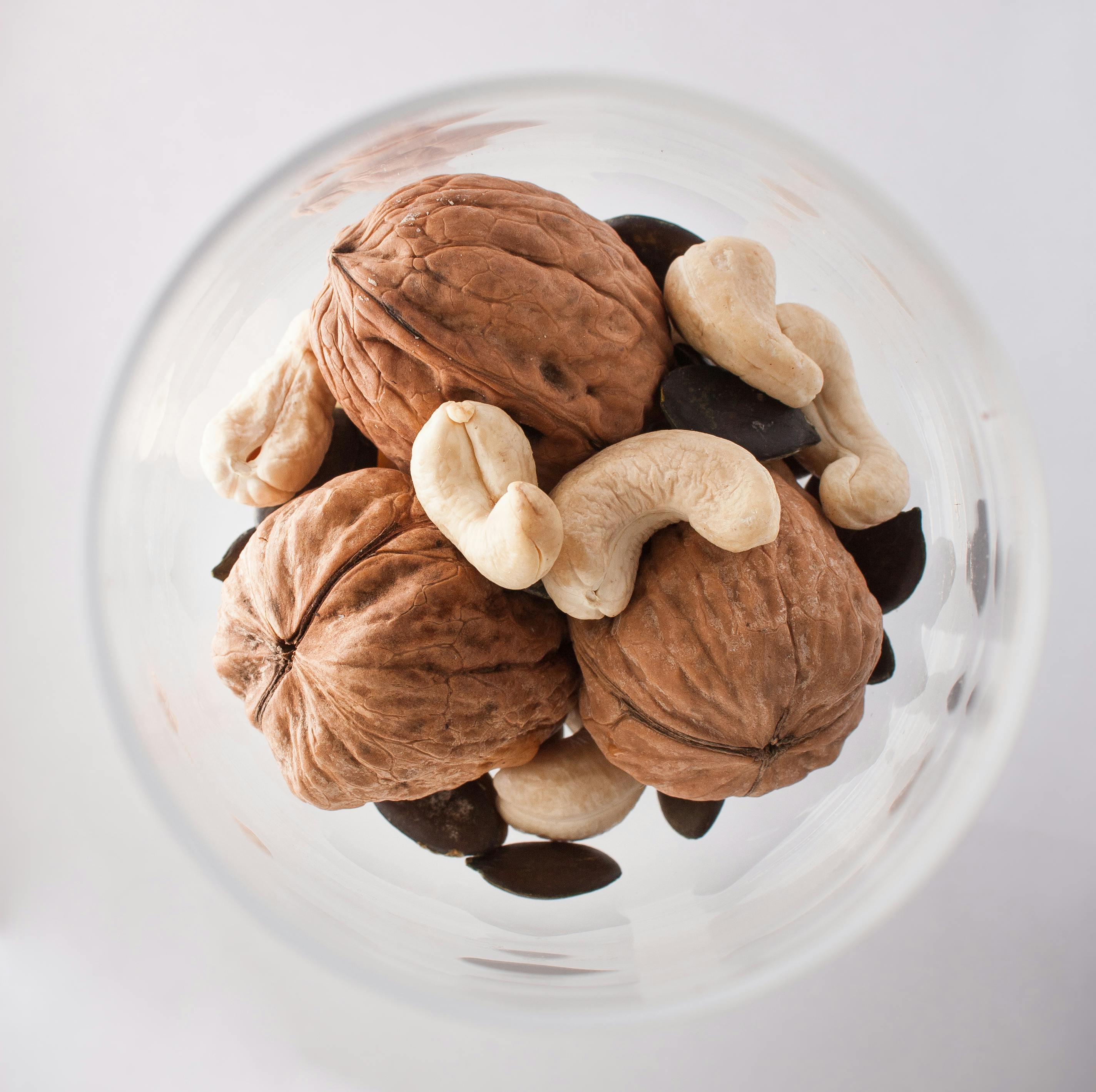 Nuts in a Clear Glass Bowl · Free Stock Photo