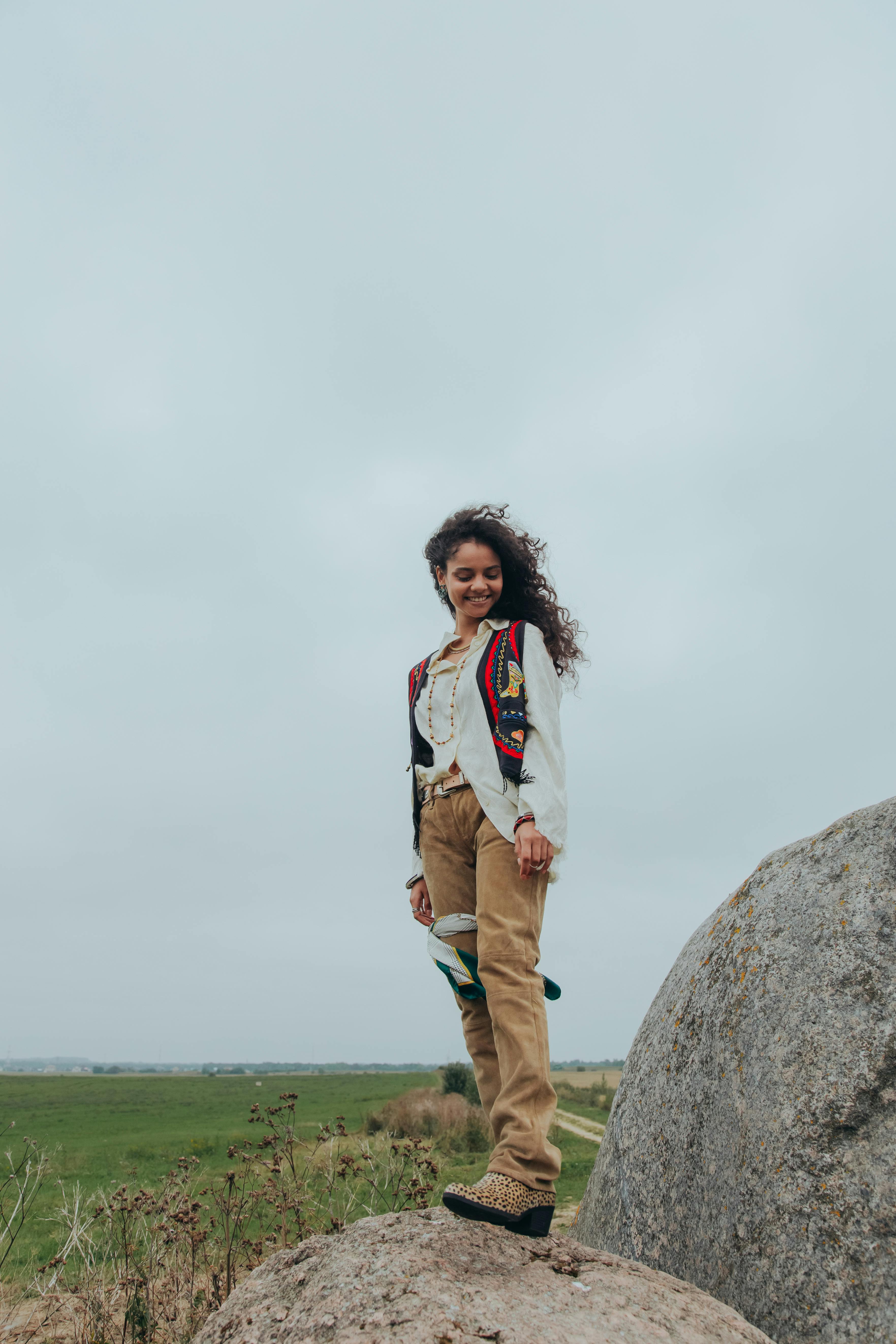 Person Standing on a Rock · Free Stock Photo