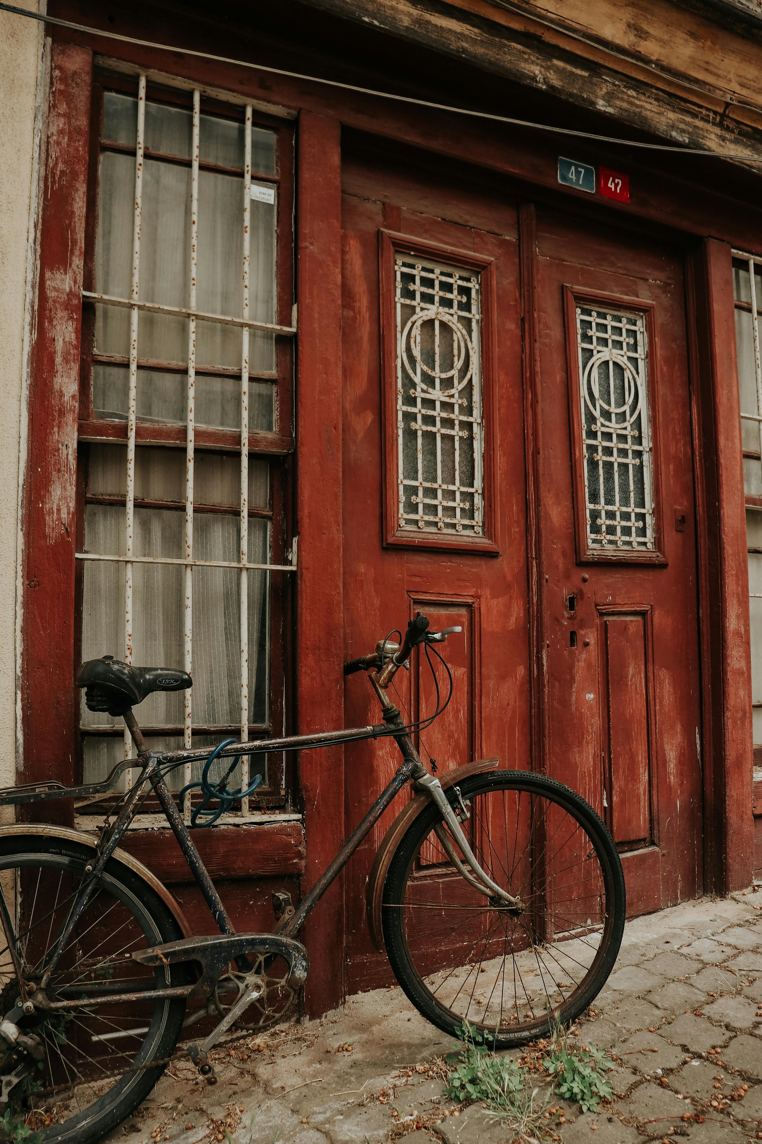 Photograph of a Red Sofa Left on the Street · Free Stock Photo