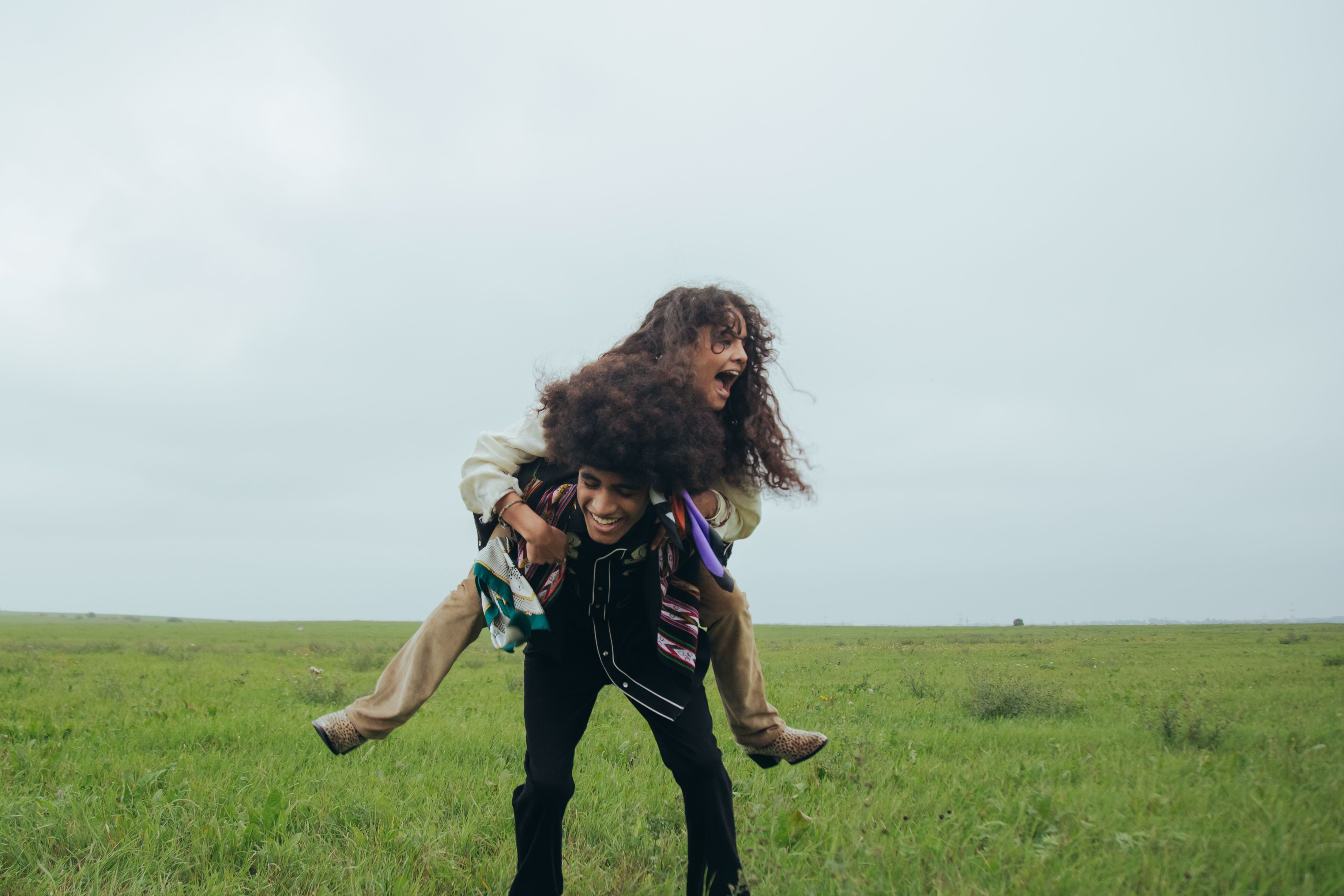 A Woman Piggy Back Riding on a Man · Free Stock Photo