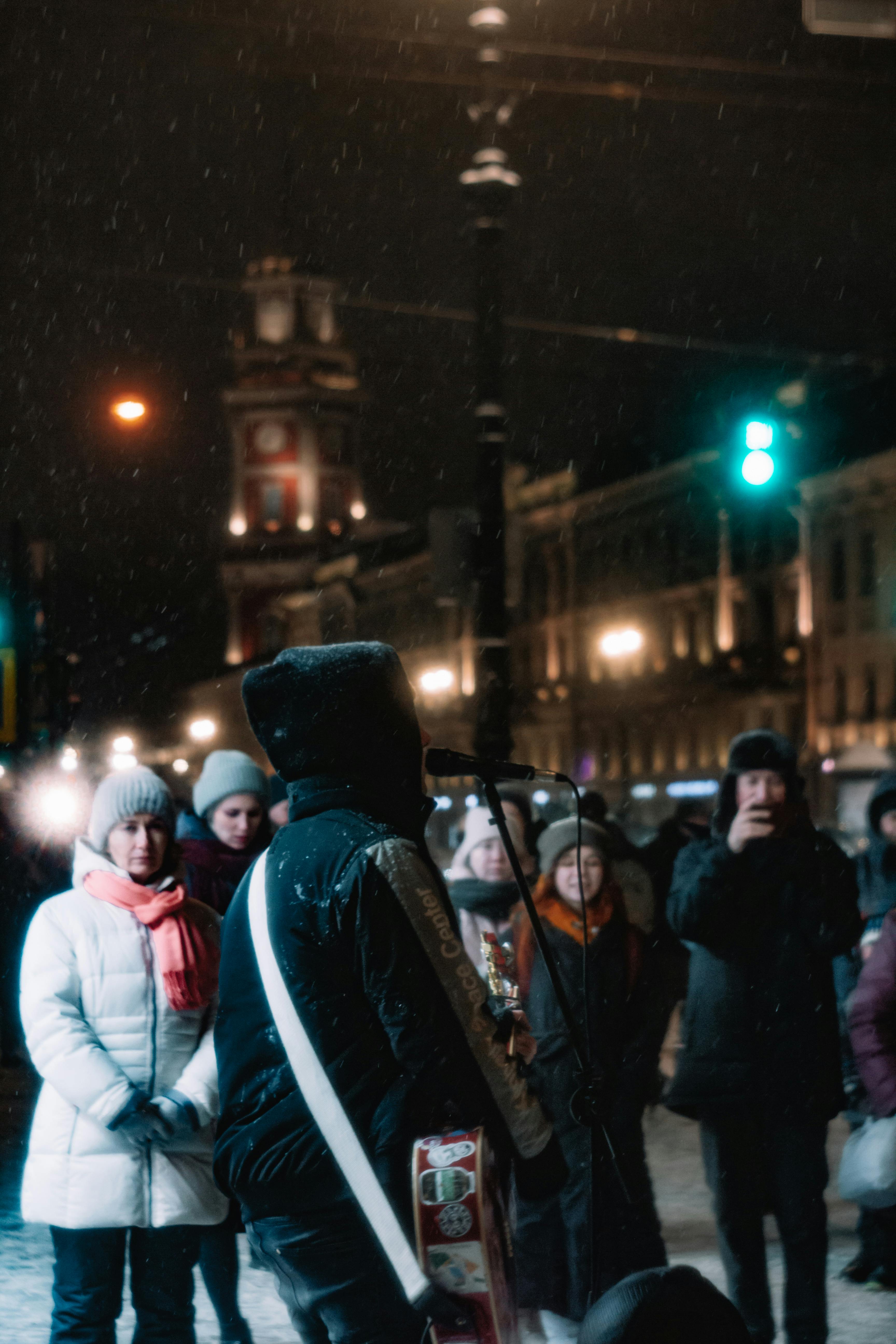 A Crowd Watching a Person Singing on the Street · Free Stock Photo