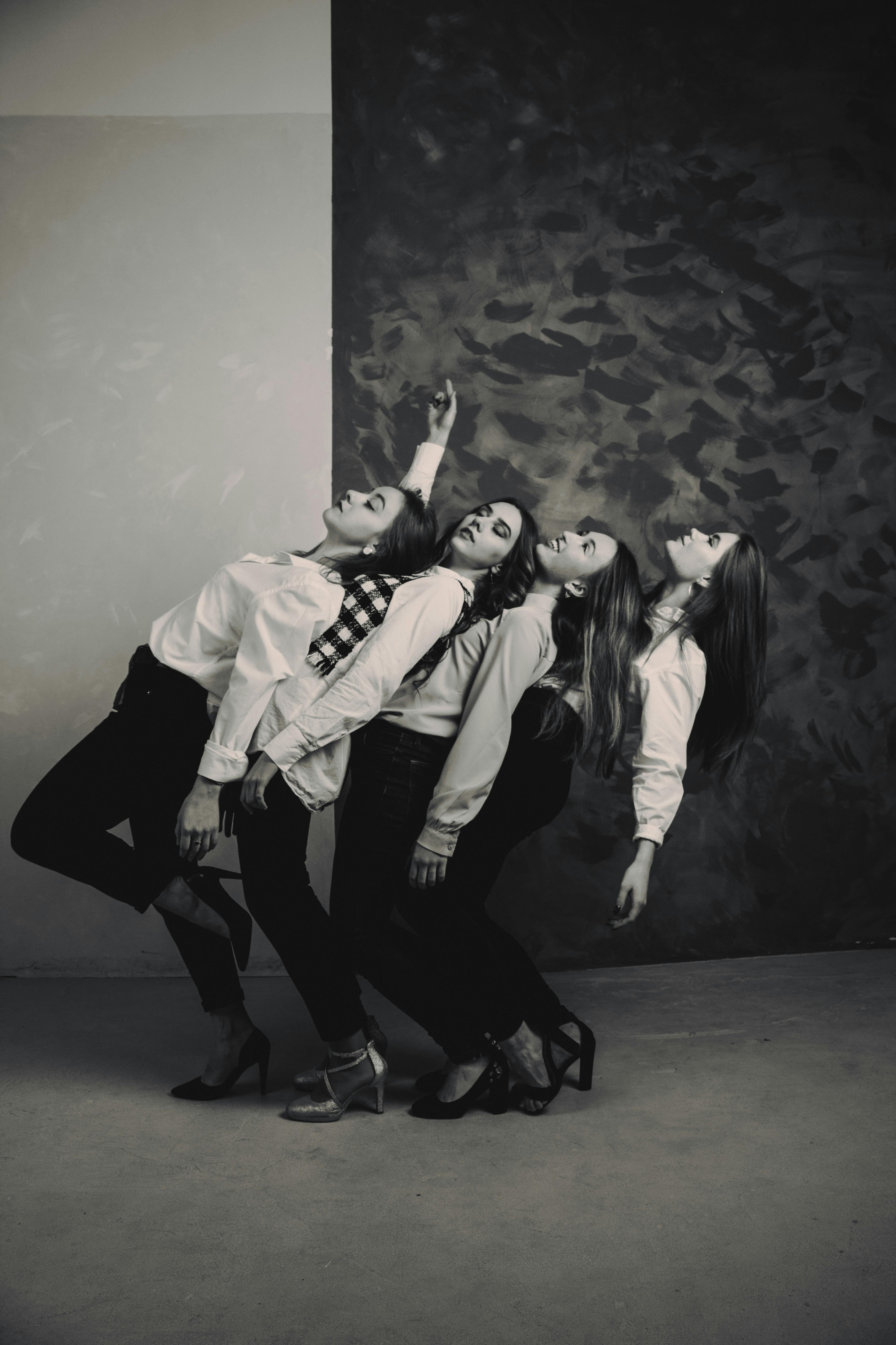 Women Leaning on Each Other · Free Stock Photo