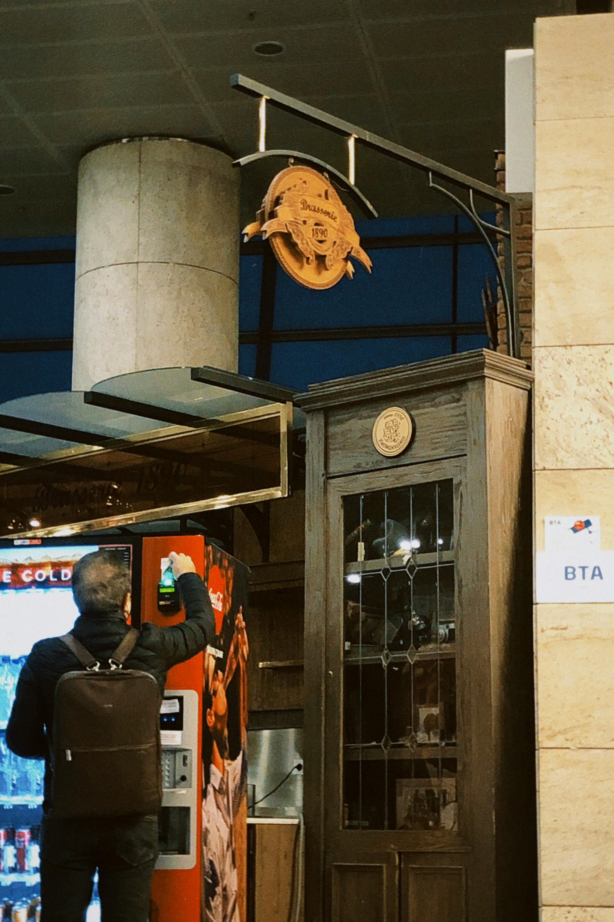 Man Using a Vending Machine · Free Stock Photo