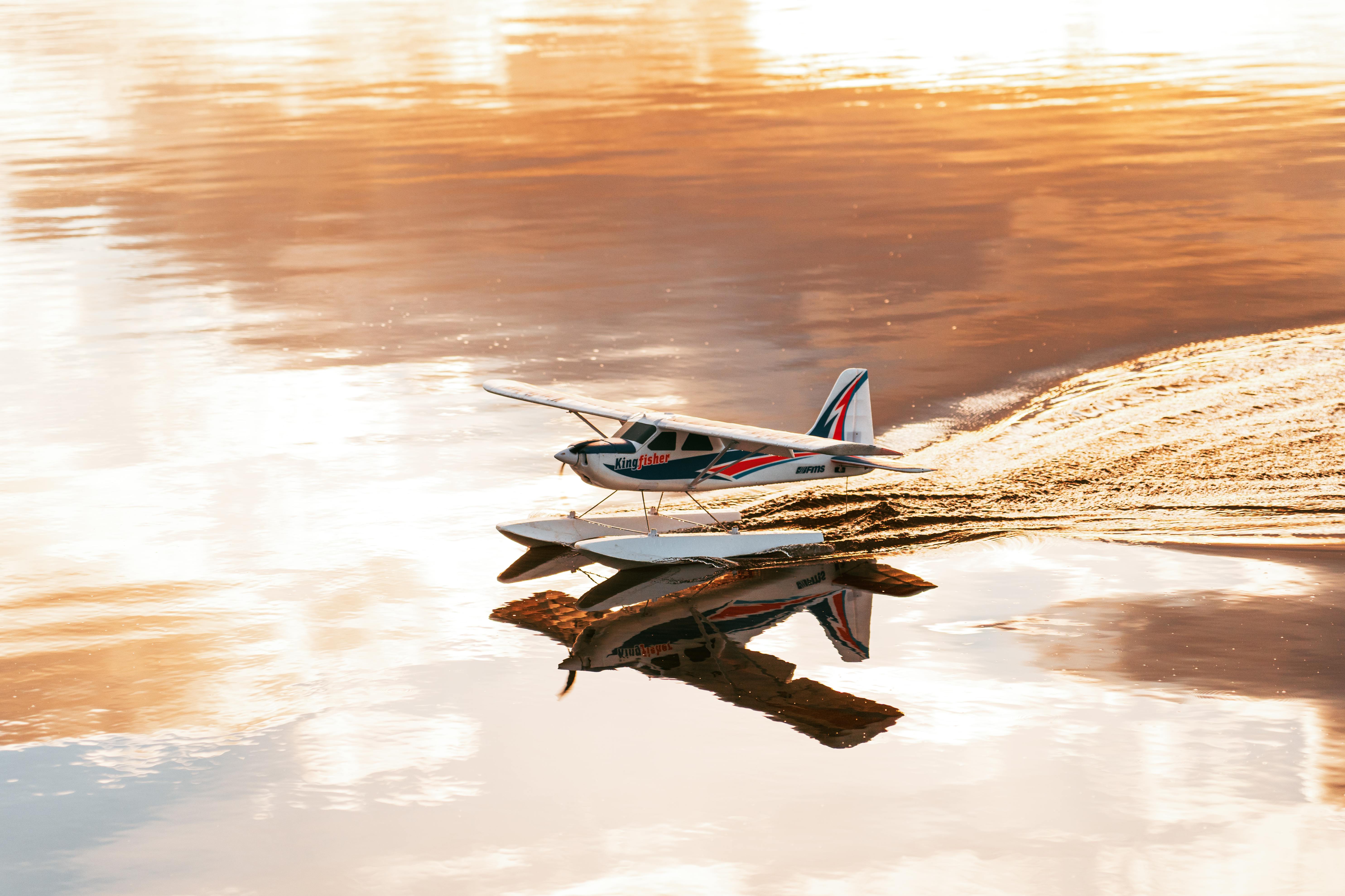 A Toy Seaplane on Water · Free Stock Photo
